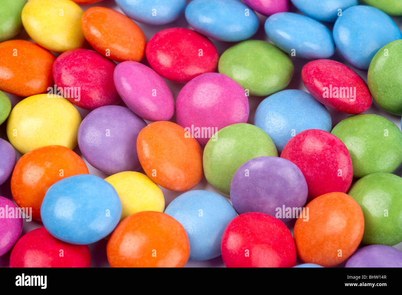 a bright and colourful selection of sugar coated candies Stock Photo ...