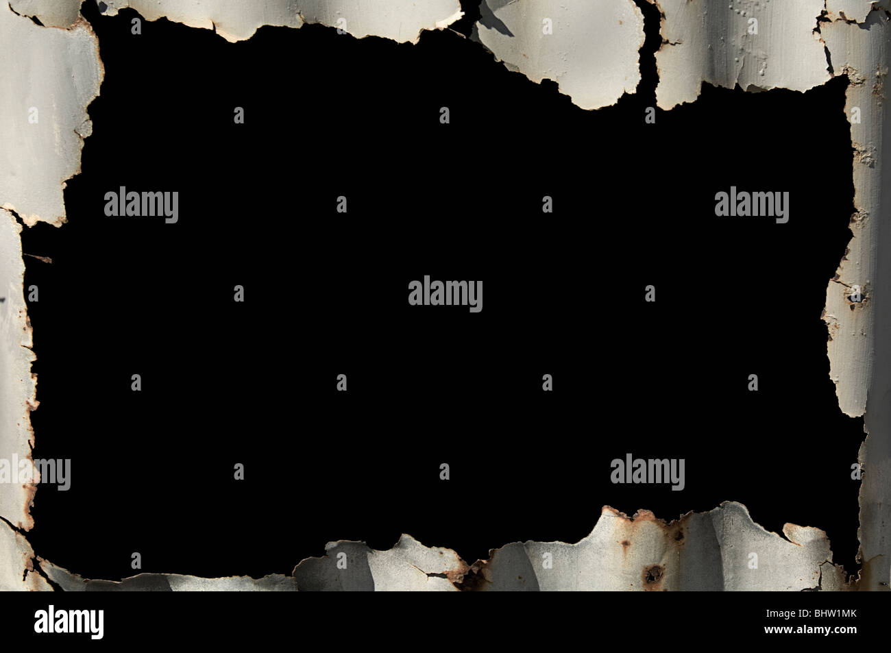 Rusty iron sheet making a frame around a black interior for copy / text ...
