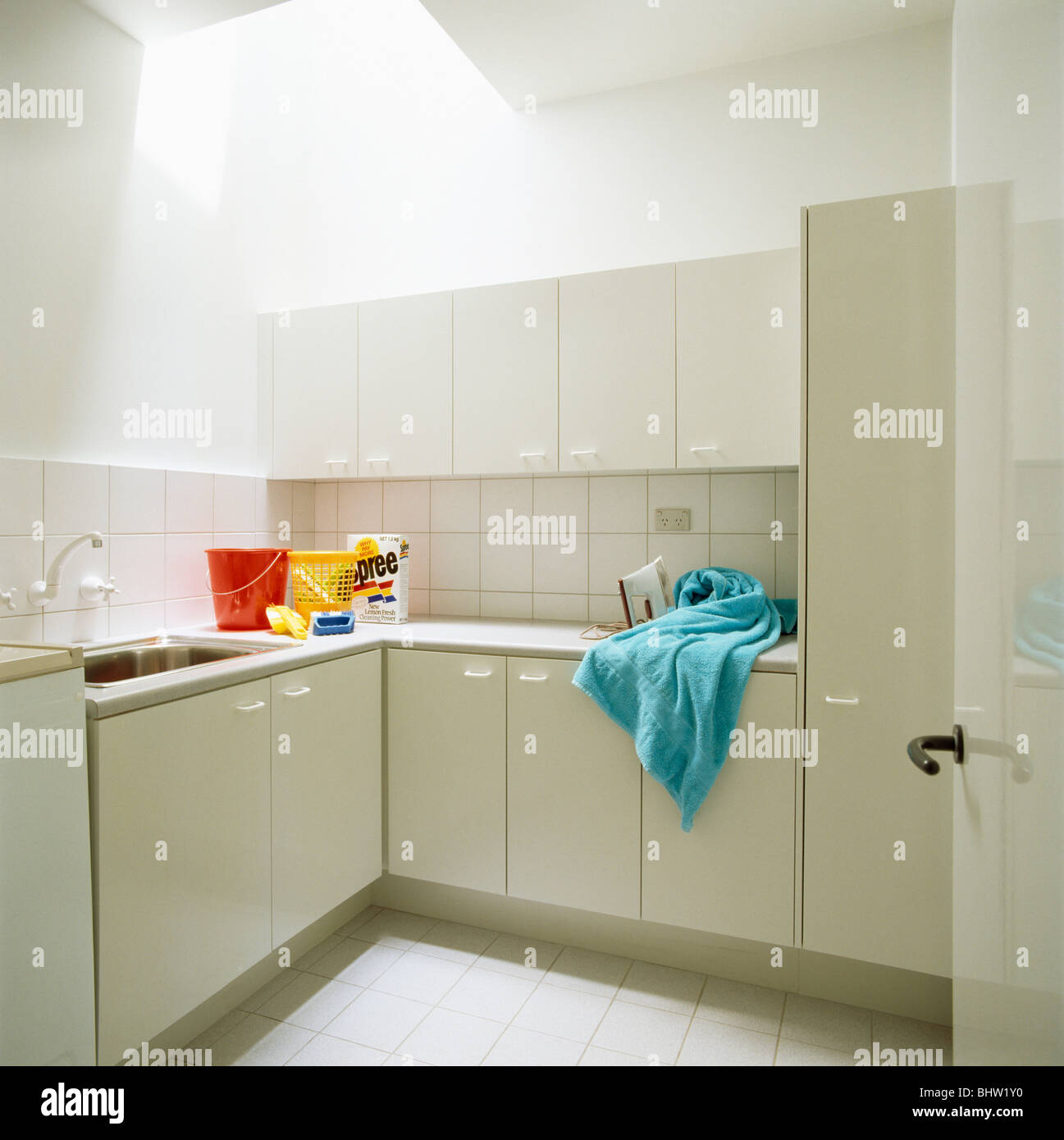 Modern white utility room Stock Photo - Alamy