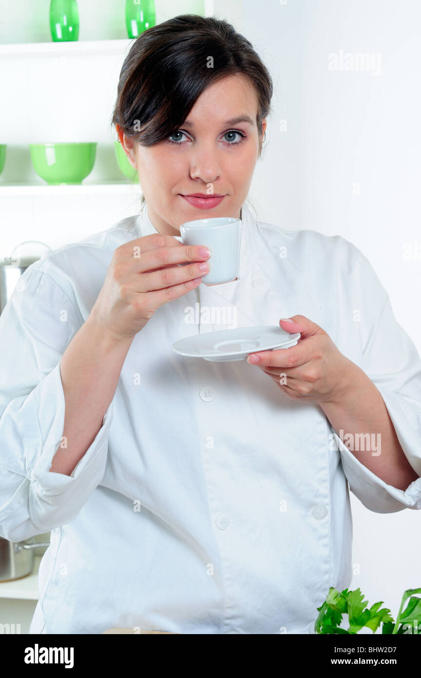 Female Chef Enjoying An Espresso Coffee Stock Photo - Alamy