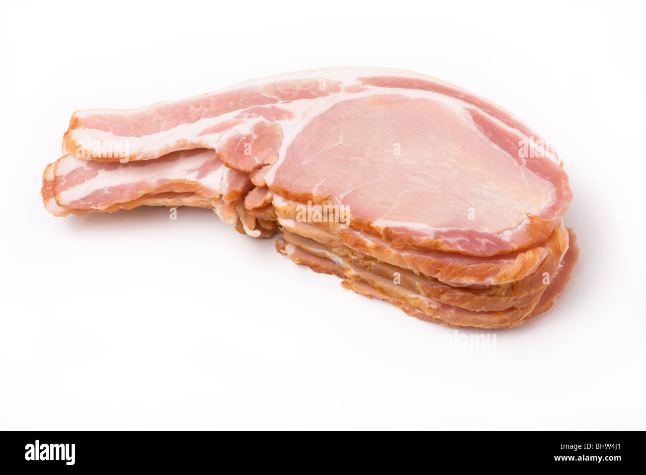 Pile of raw uncooked Sliced bacon isolated against white background ...
