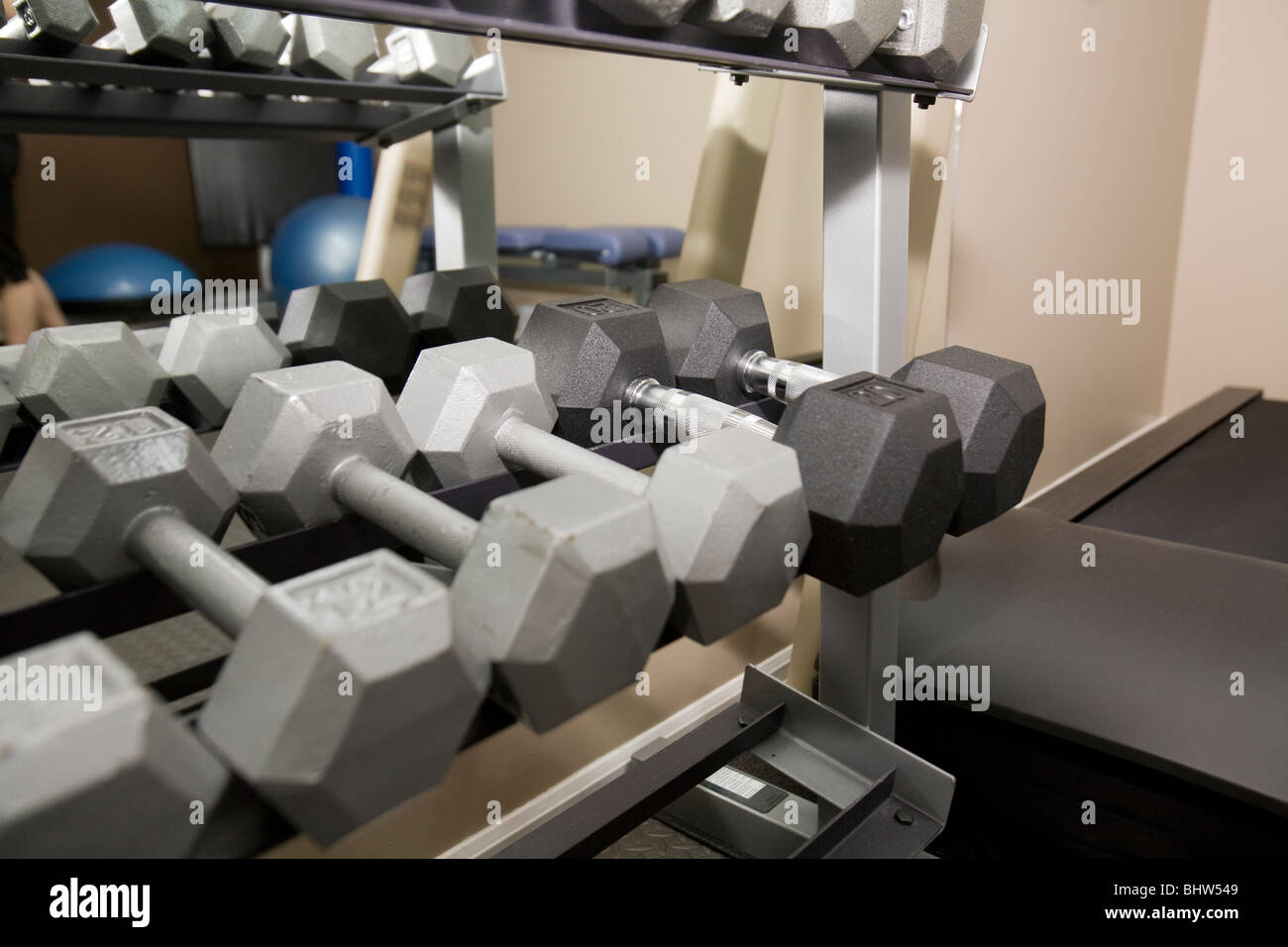 weights in a weight room Stock Photo - Alamy