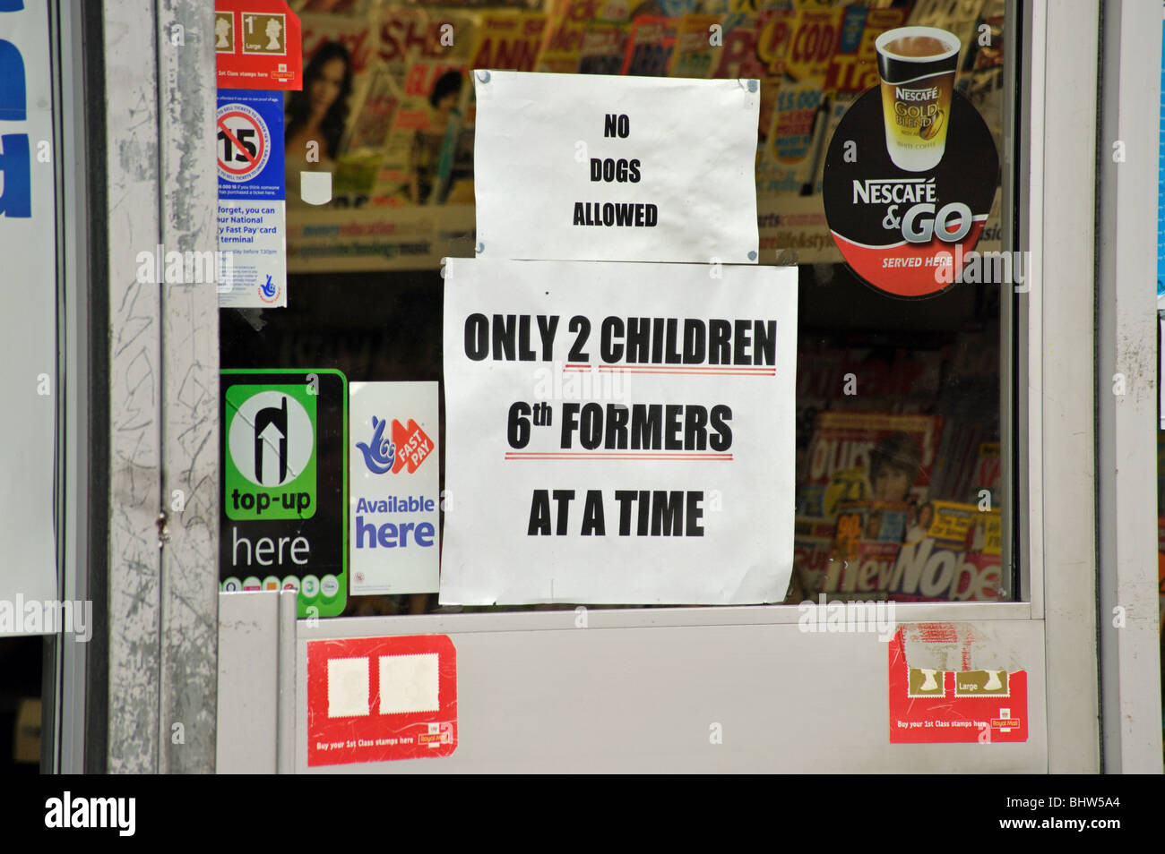 A newsagents with a sign stating that only two children will be ...