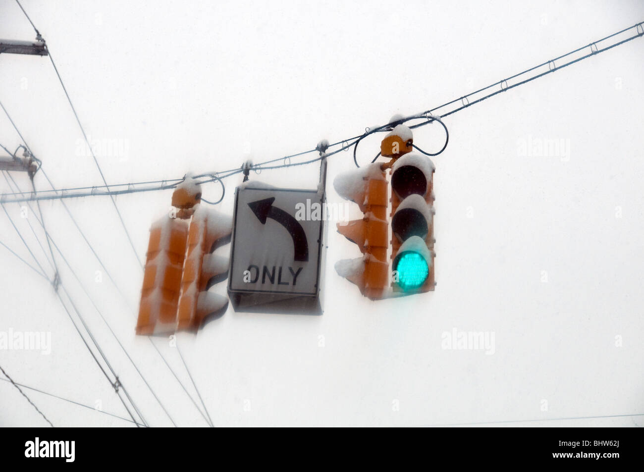 Traffic light in winter storm Stock Photo - Alamy