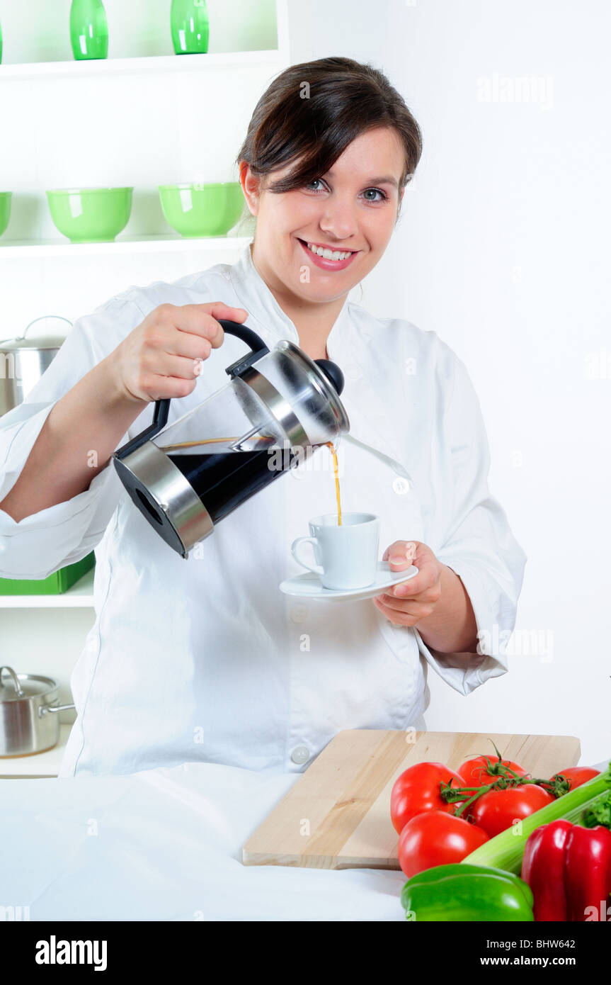 Female Chef Enjoying An Espresso Coffee Stock Photo - Alamy