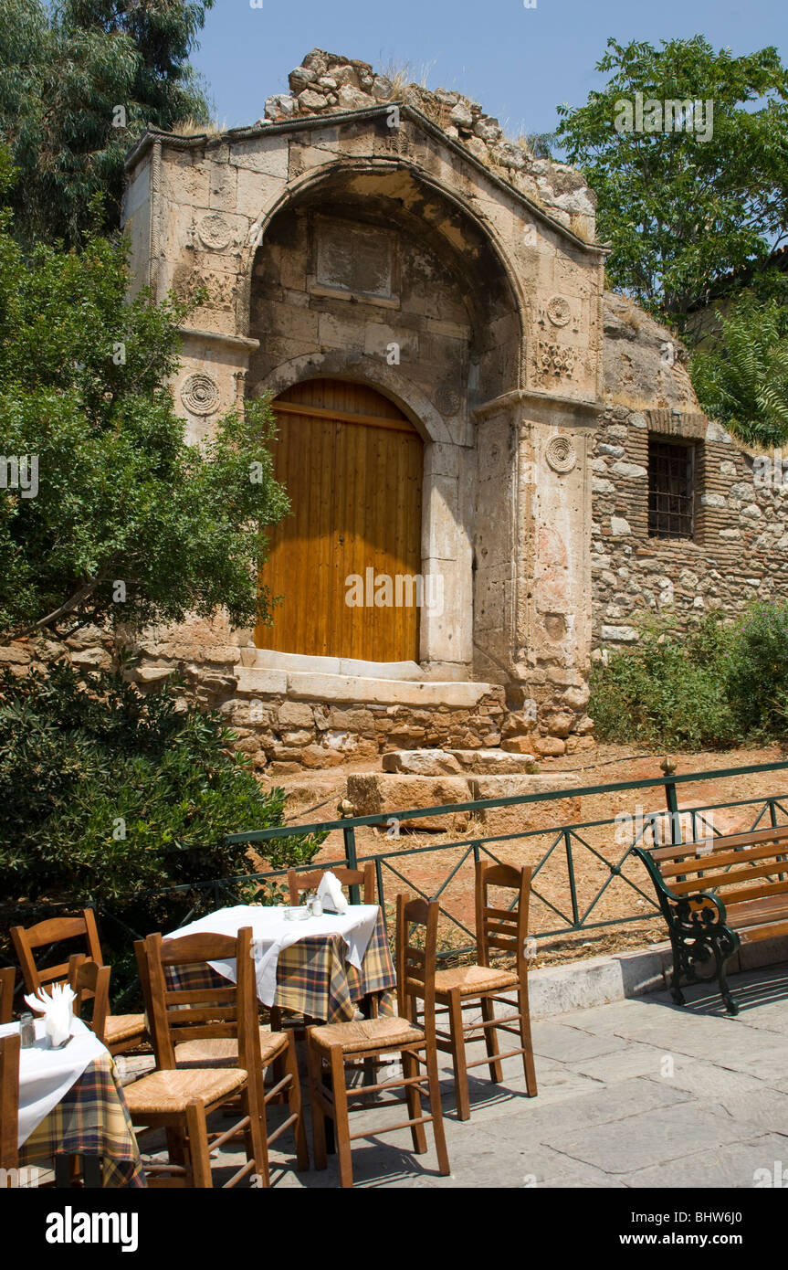Taverna tables in front of an old door in central Athens, Greece Stock ...