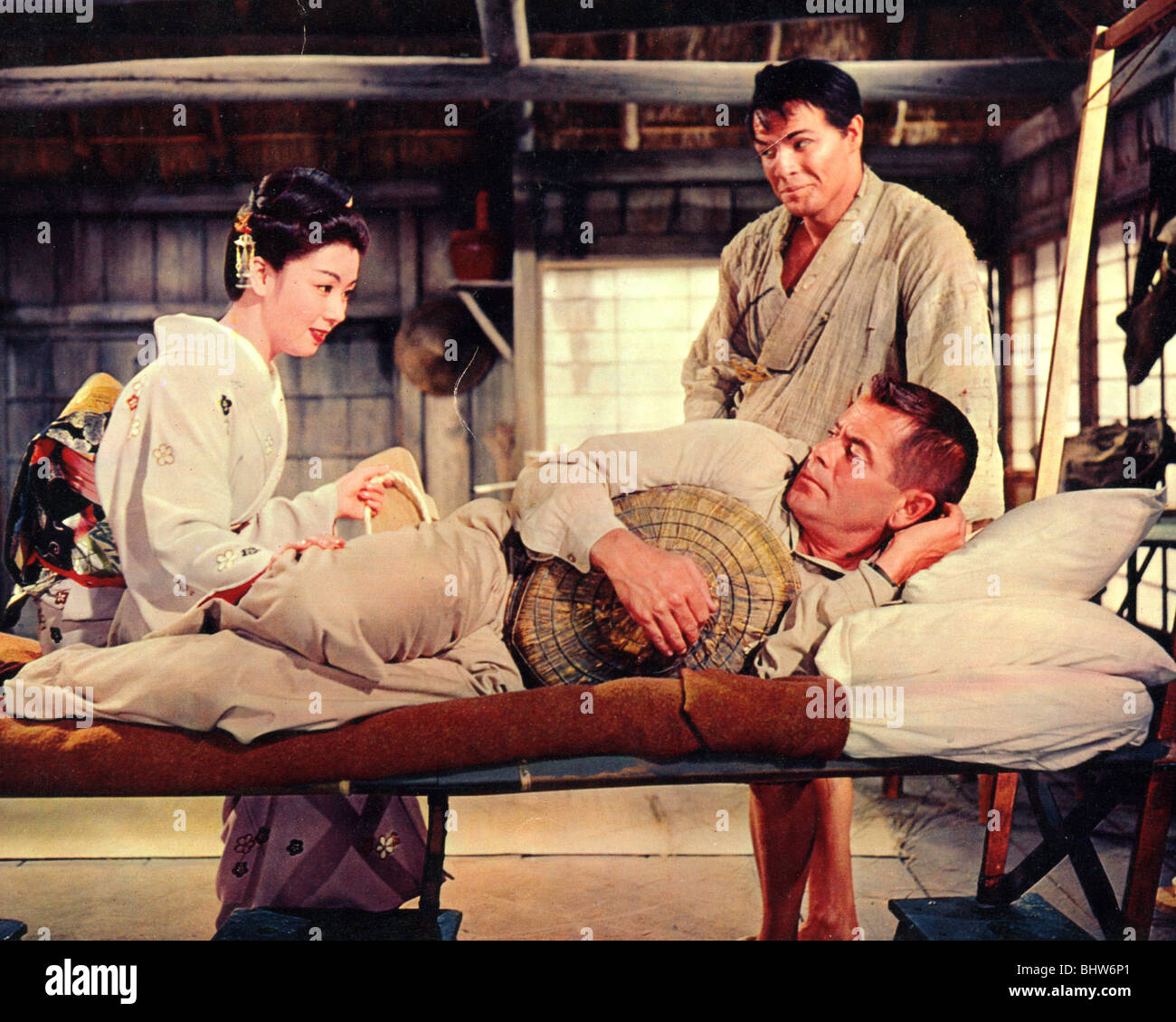 TEAHOUSE OF THE AUGUST MOON - 1956 MGM film with Glen Ford on bed and ...