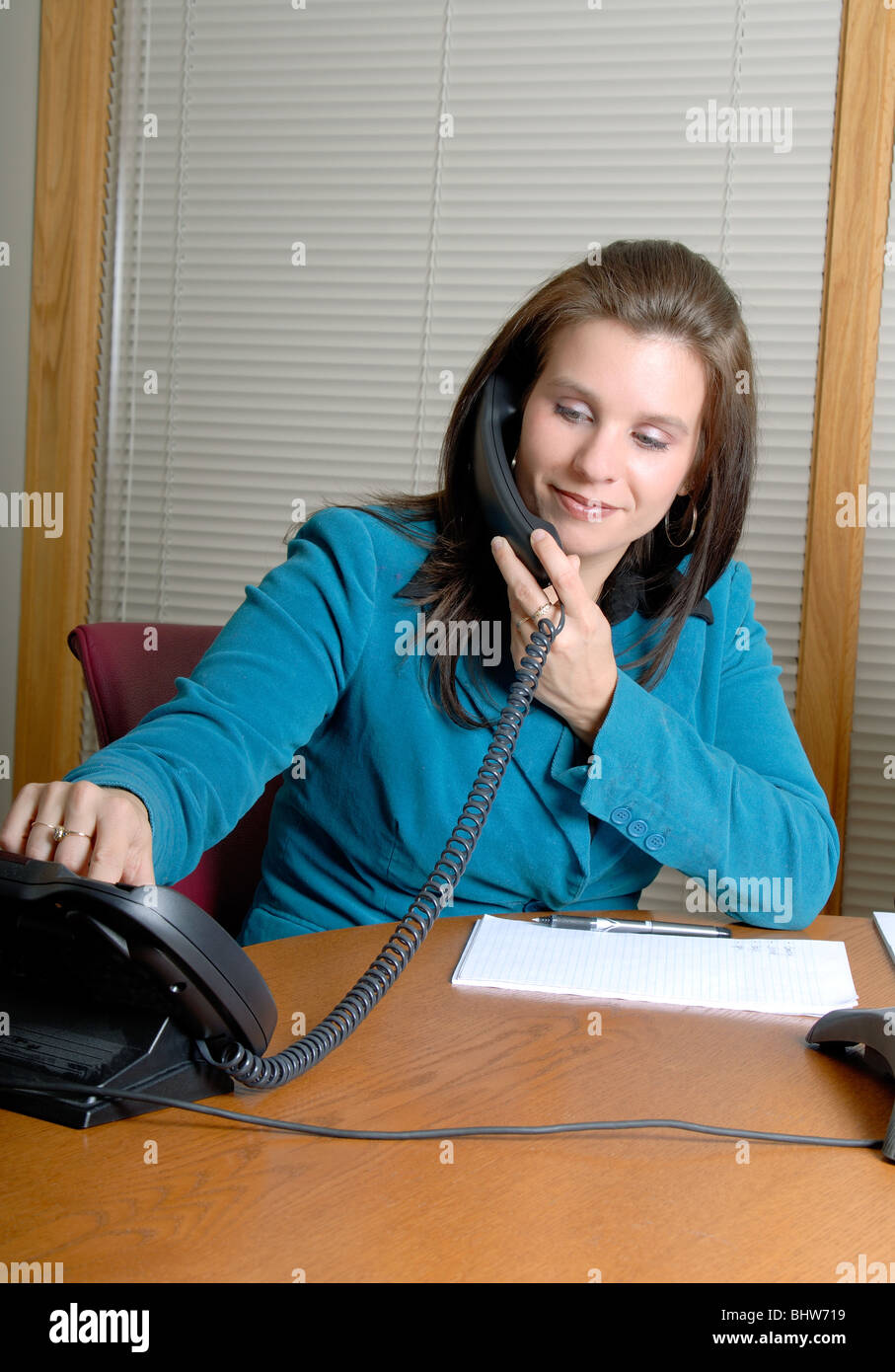 Businesswoman Making A Phone Call Stock Photo - Alamy