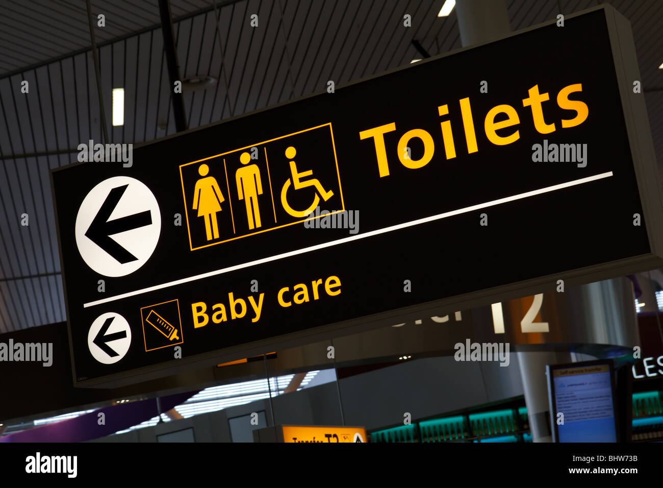 Sing board at airport Stock Photo - Alamy