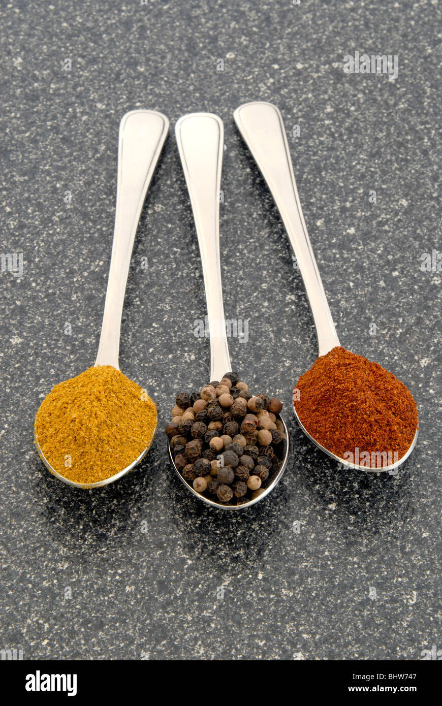 Silver spoons with spices hi-res stock photography and images - Alamy