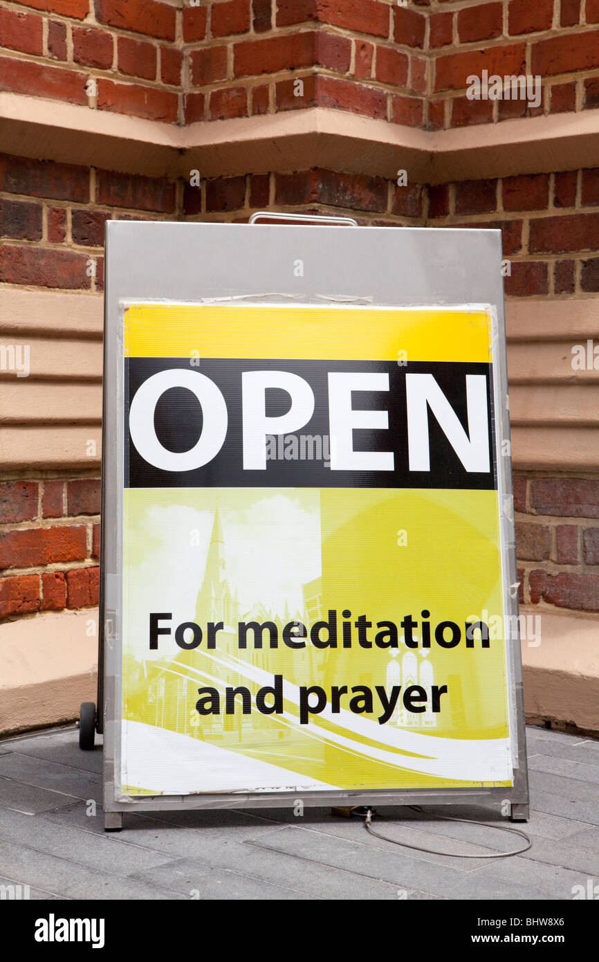 Open For Meditation and Prayer sign outside a church Stock Photo - Alamy