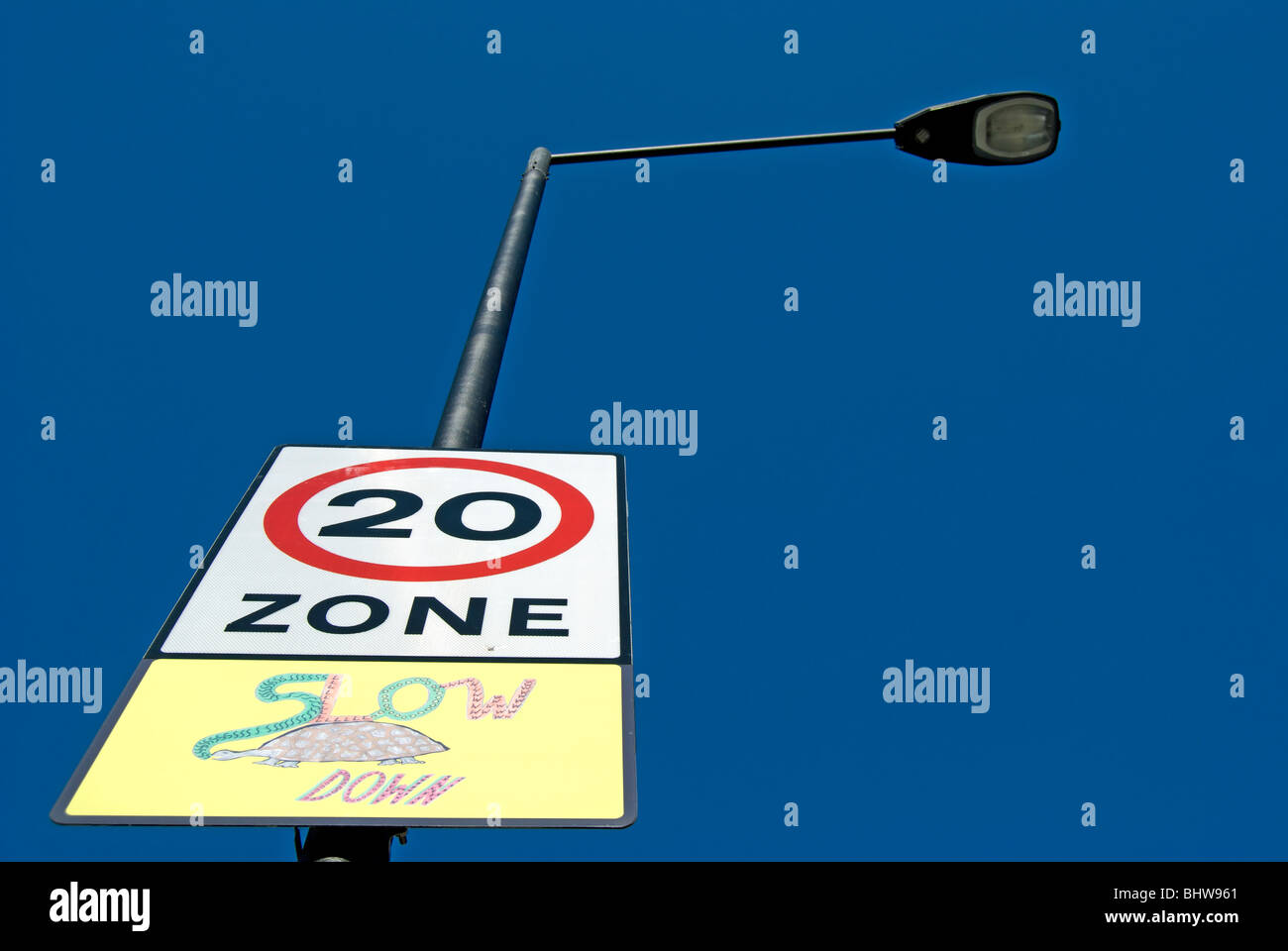 british road sign indicating 20mph zone with illustration of tortoise ...