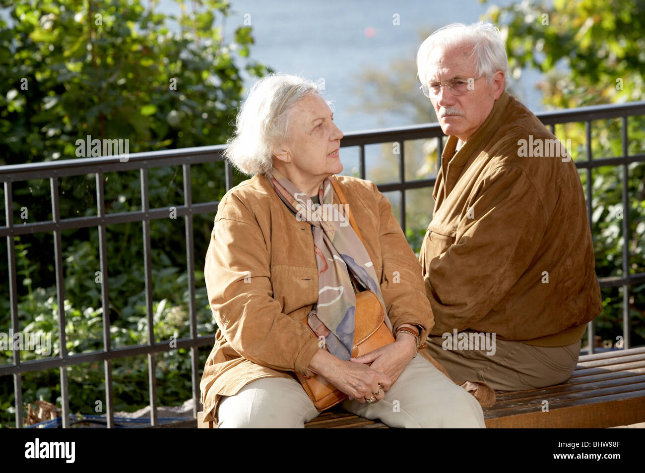 Elderly people sitting on a bench, Ploen, Germany Stock Photo - Alamy