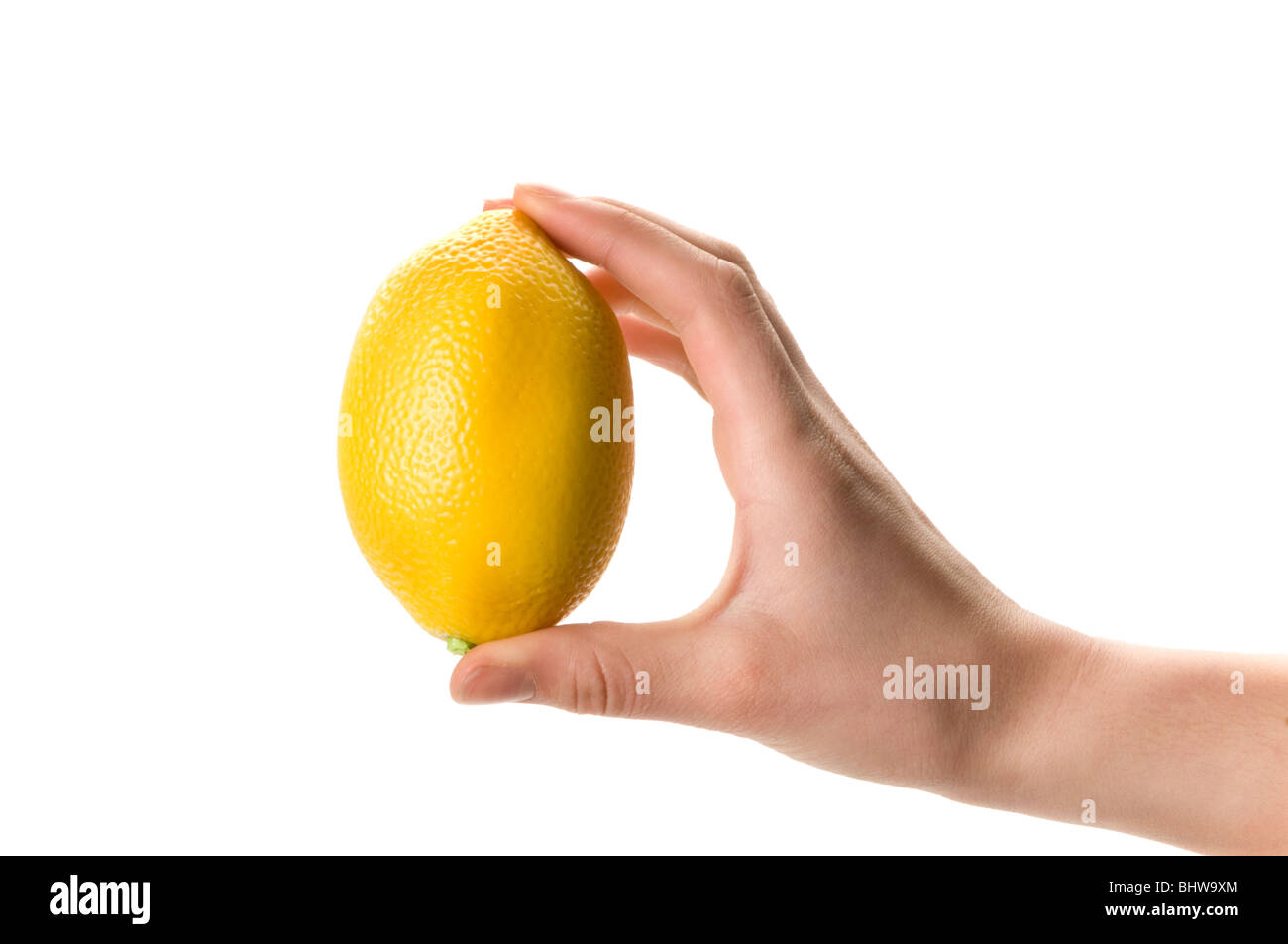 hand holding lemon Stock Photo - Alamy