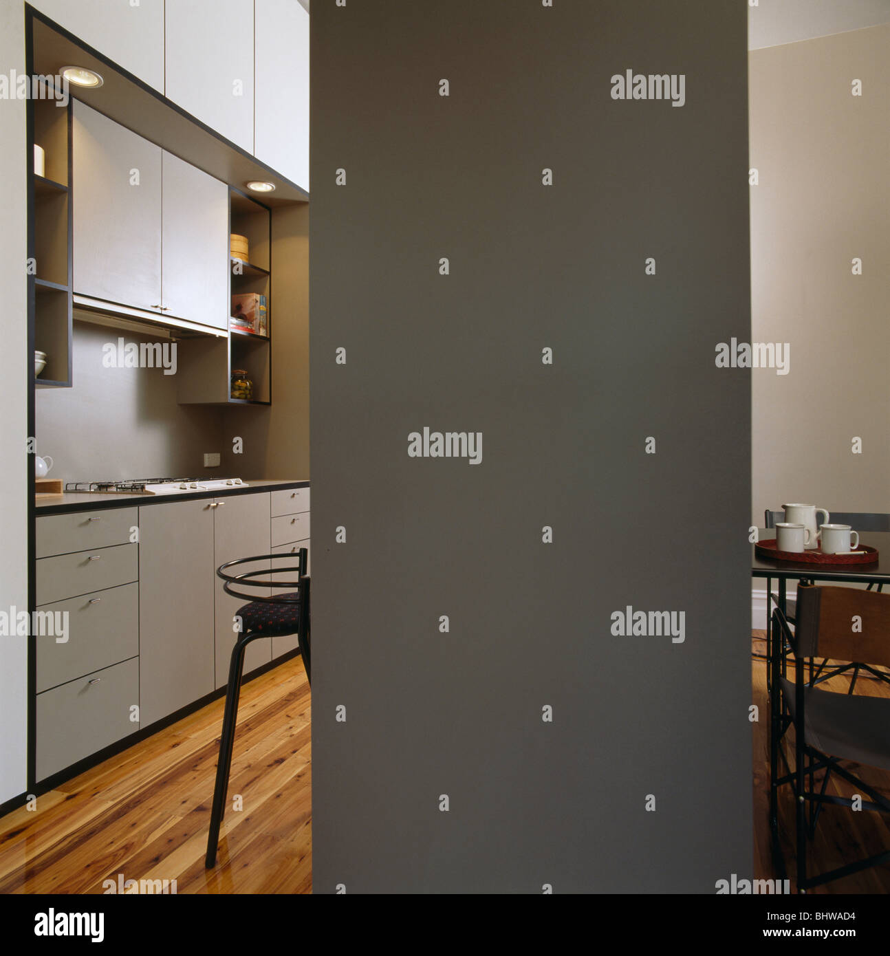 Modern kitchen with fitted white units Stock Photo - Alamy