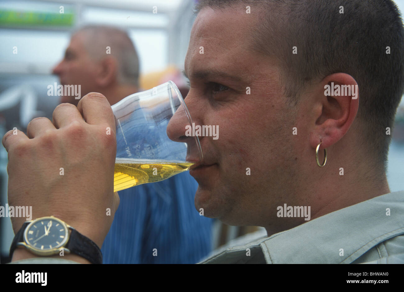 man drinking lager Stock Photo - Alamy