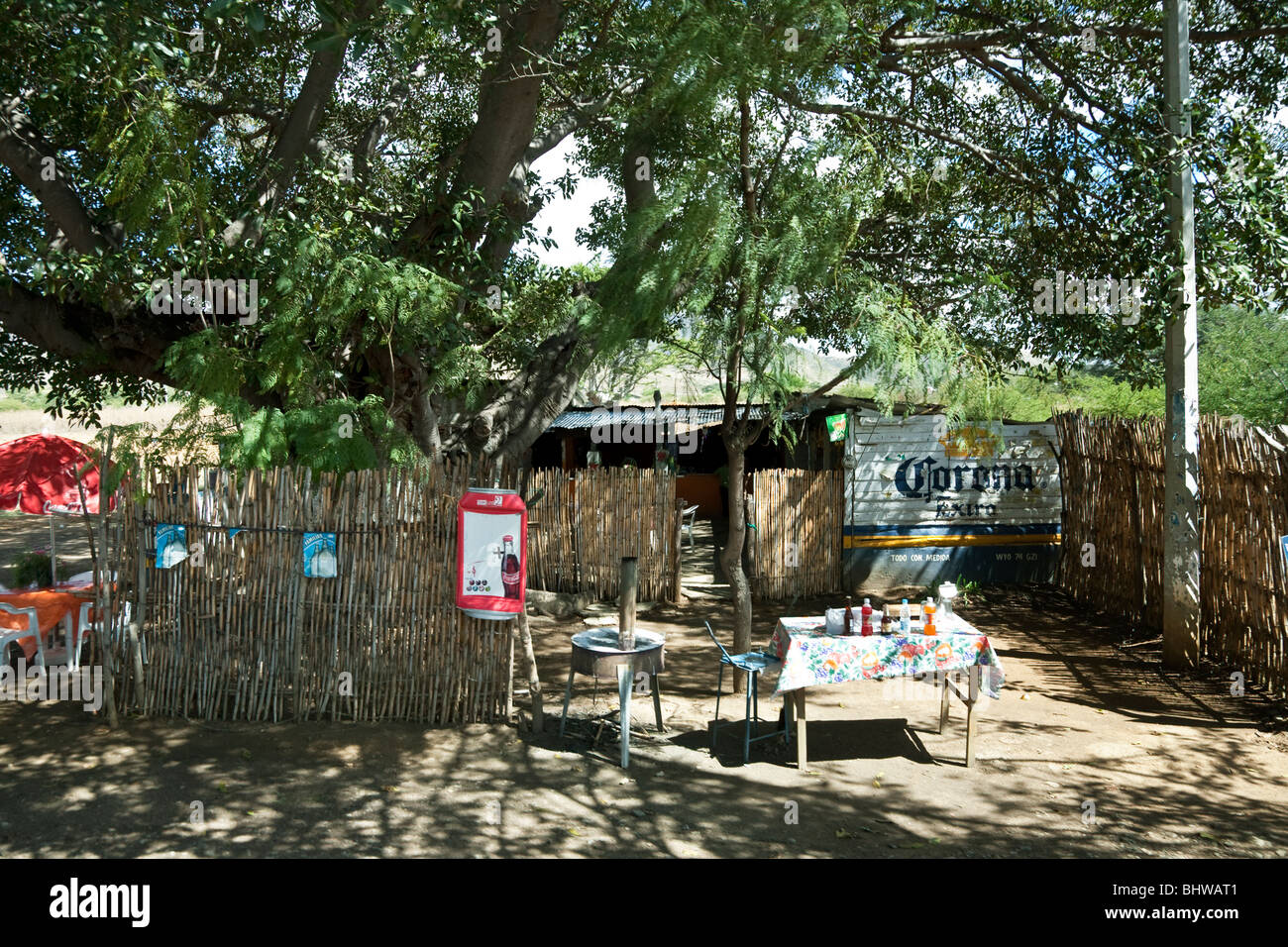 primitive but inviting roadside restaurant complete with charcoal stove ...