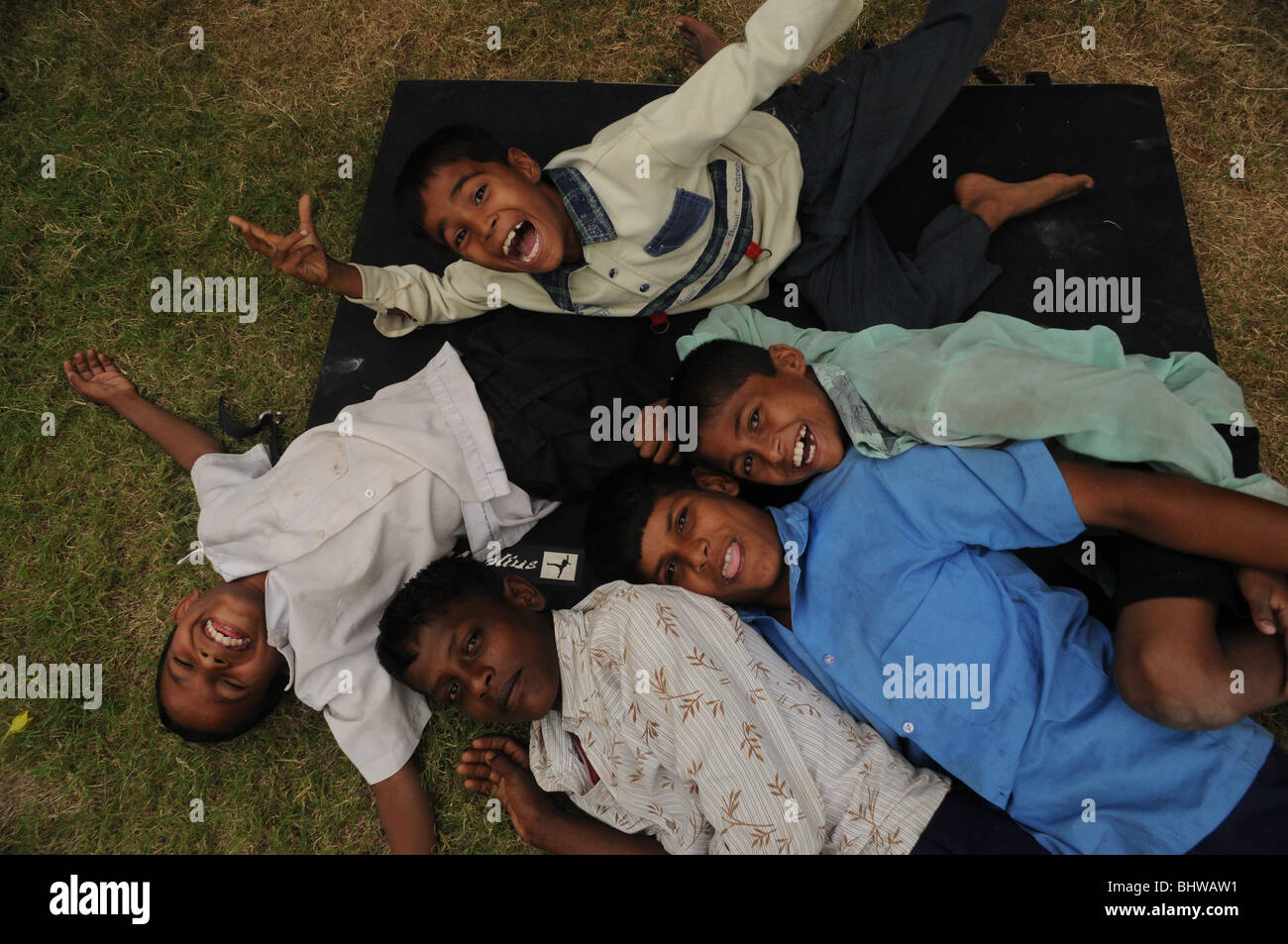 Children playing on boulder mat Stock Photo - Alamy