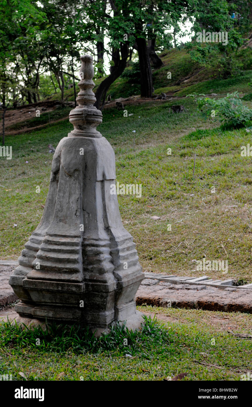 old small stupa in the park of wat phnom , phnom penh , cambodia ...