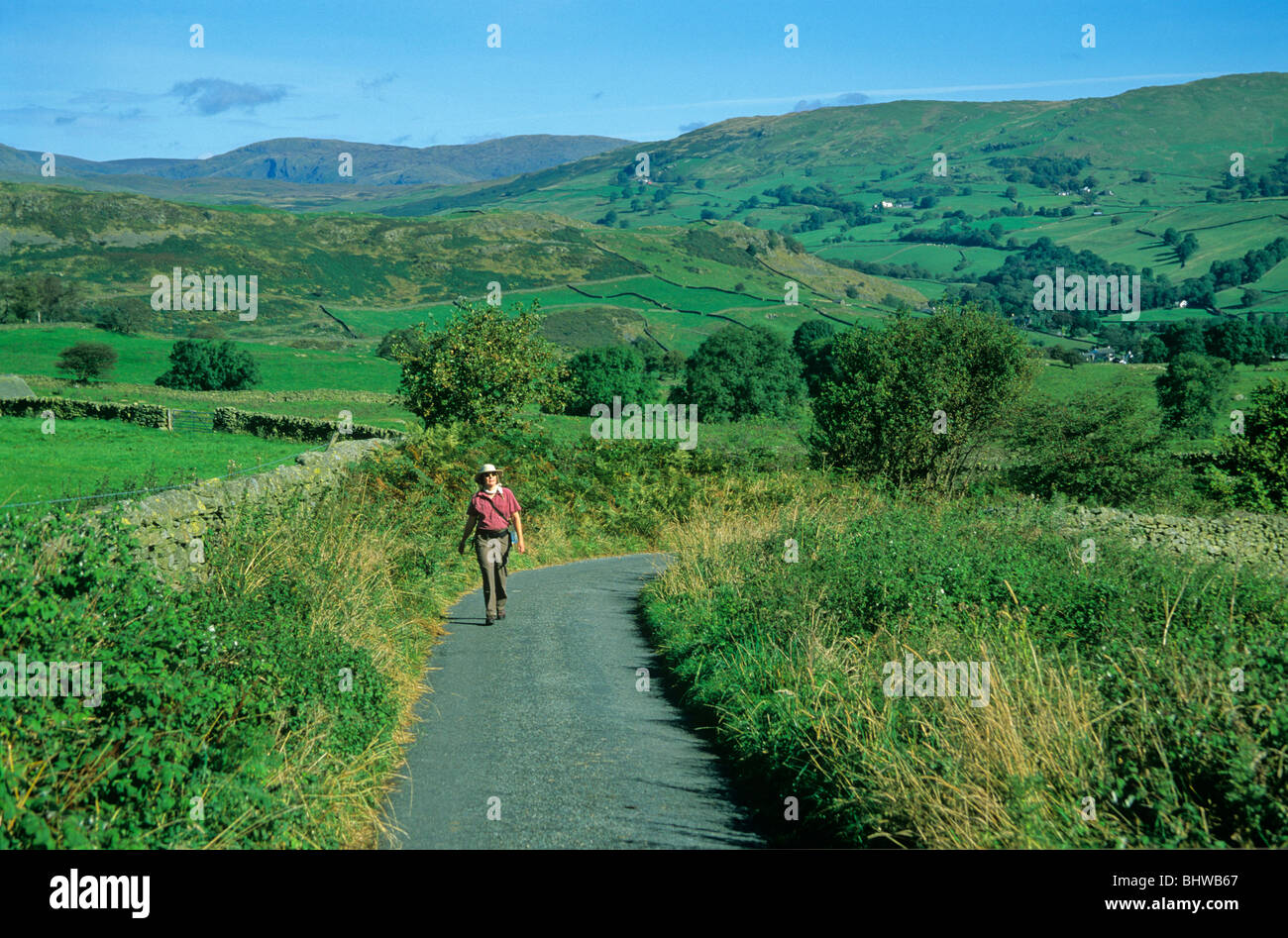Walking through English countryside on the Dales Way in Lake District ...
