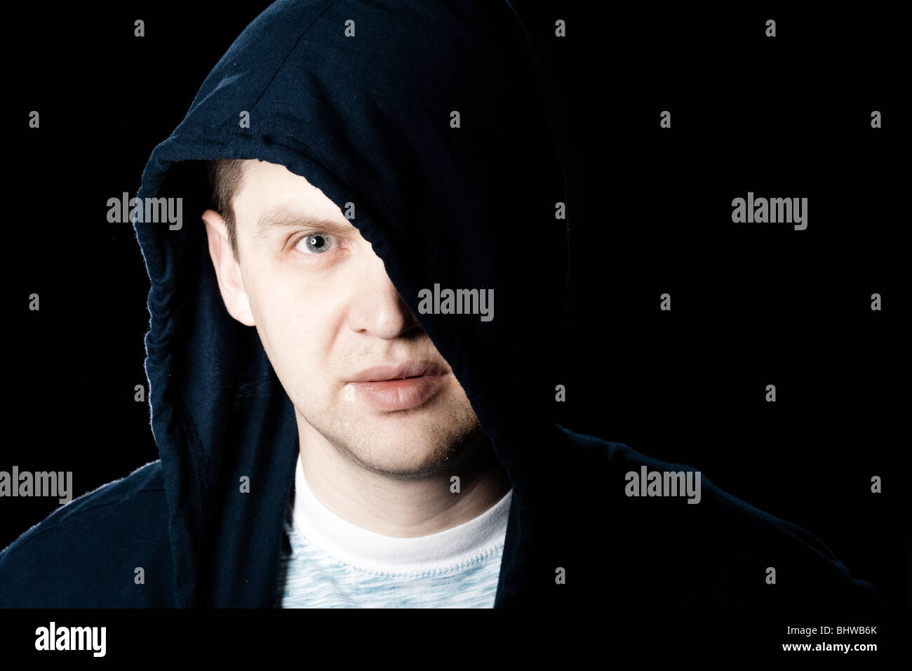 man in hood Stock Photo - Alamy