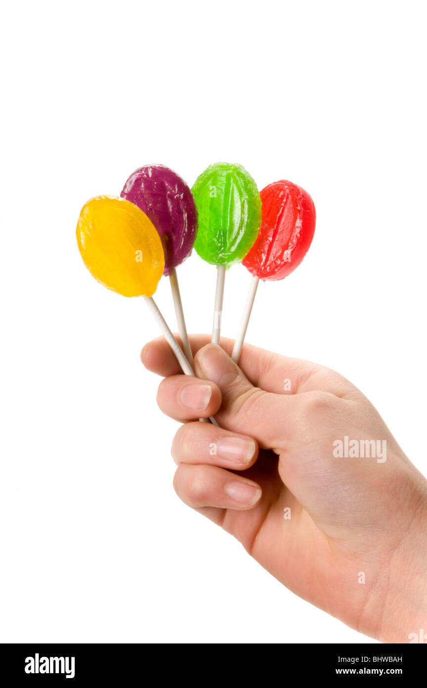 hand and colorful suckers candy Stock Photo Alamy