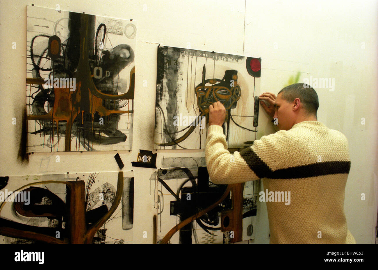 American underground graffiti artist Doze Green paints in his Brooklyn ...