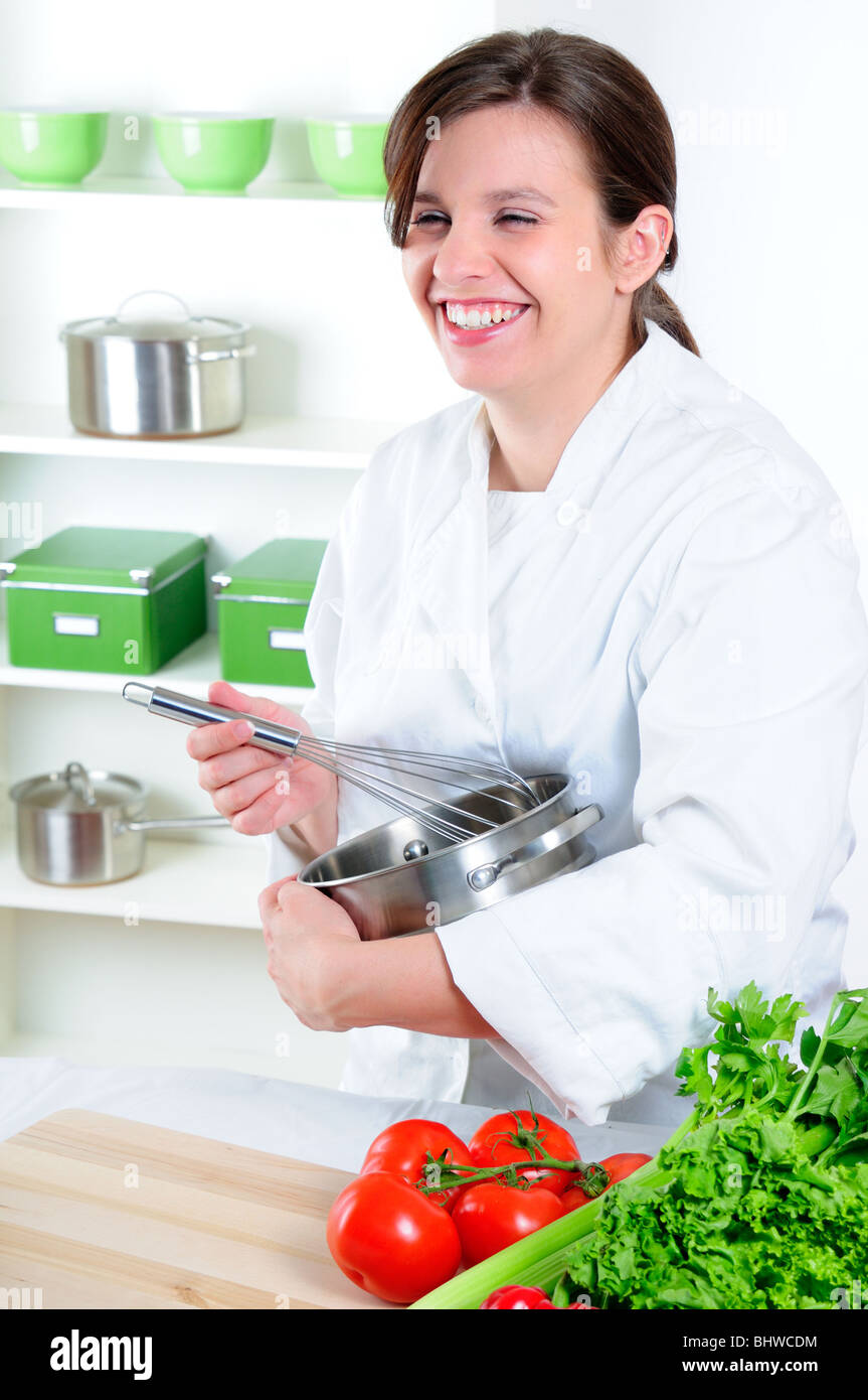 Woman Chef In Her Kitchen Stock Photo - Alamy