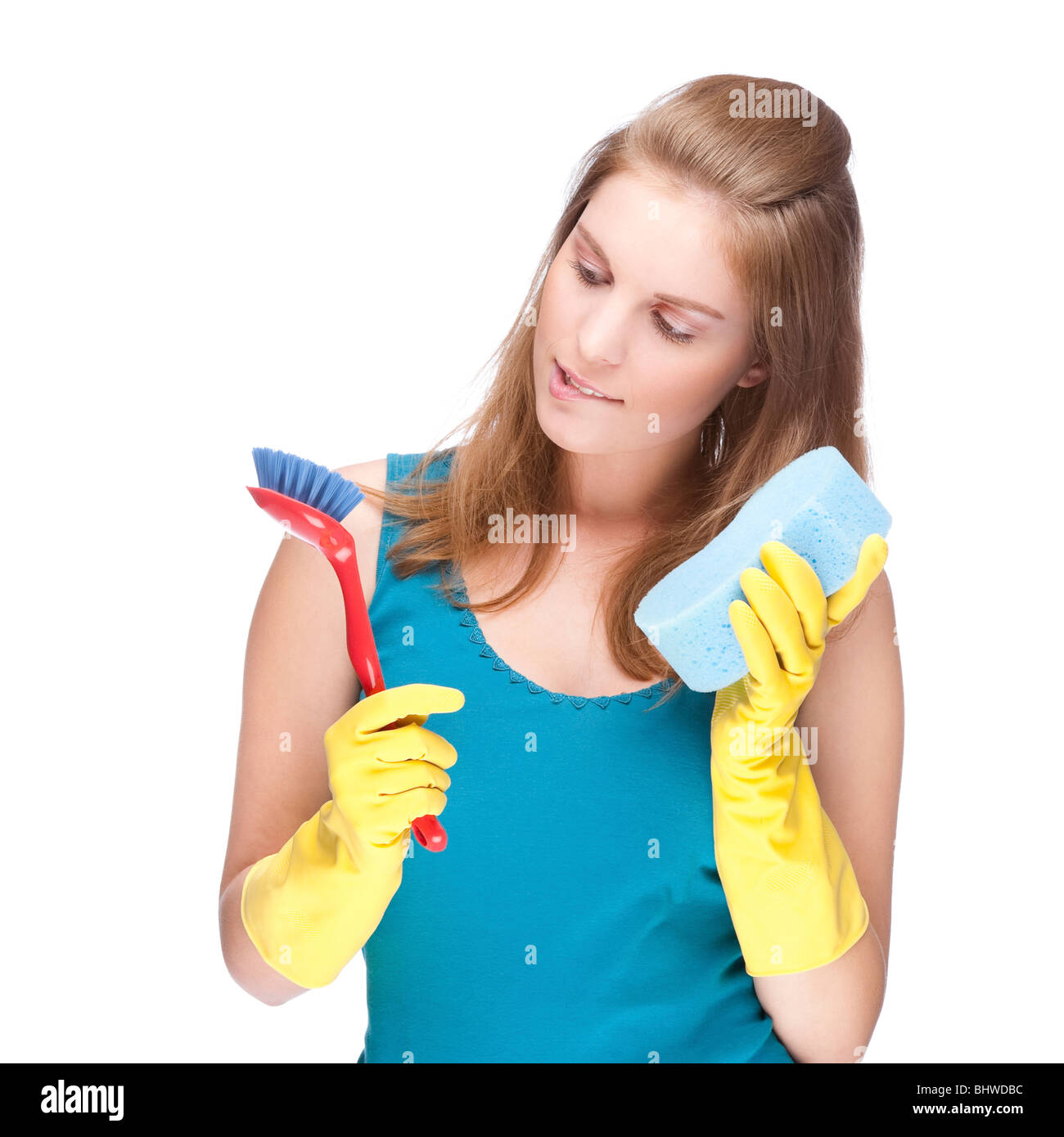 Full isolated studio picture from a young and beautiful cleaning lady ...