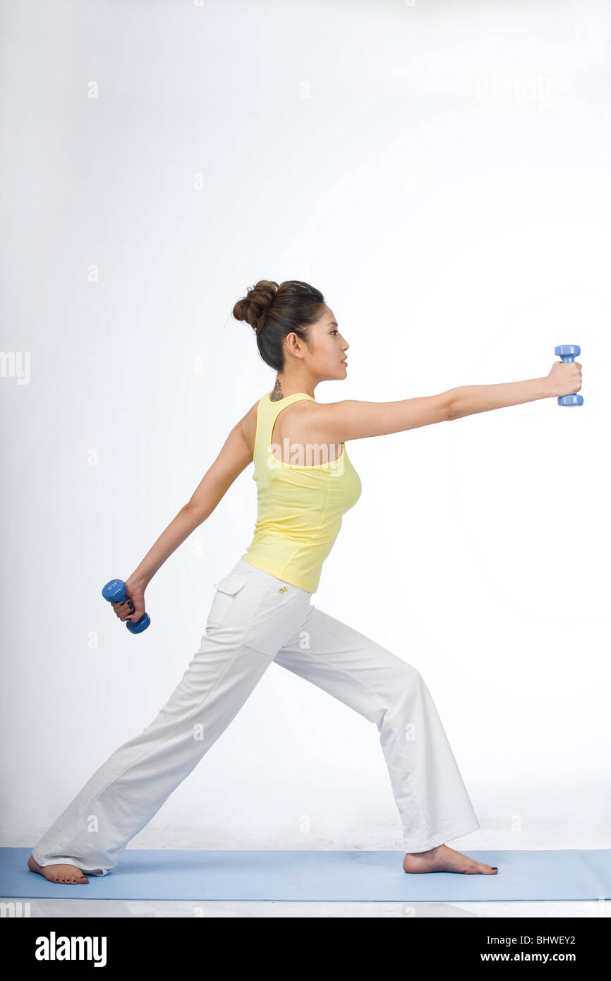 Woman in gyms Stock Photo - Alamy