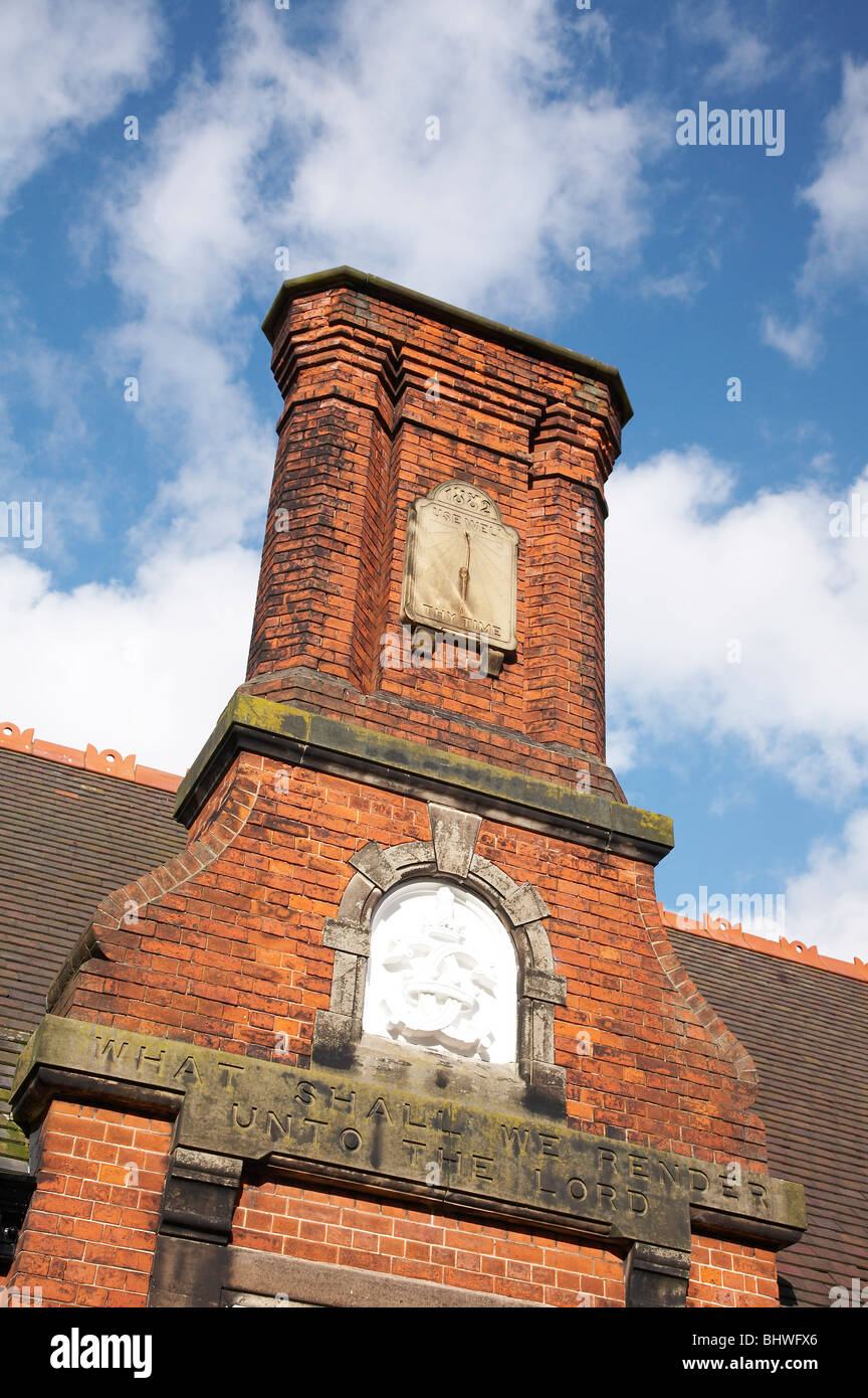 Victorian chimney with build in artwork and slogan Stock Photo - Alamy