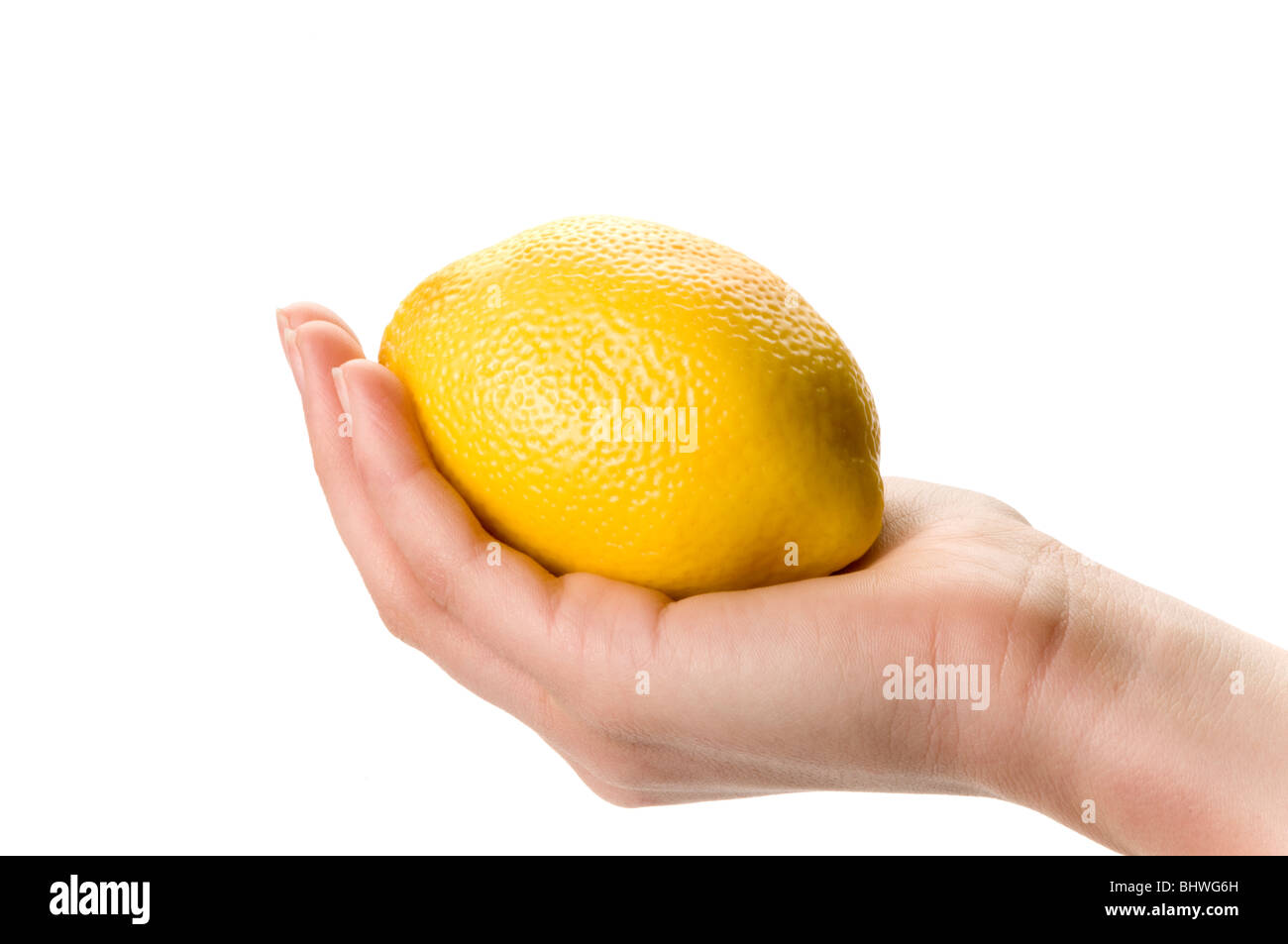 hand holding lemon Stock Photo - Alamy