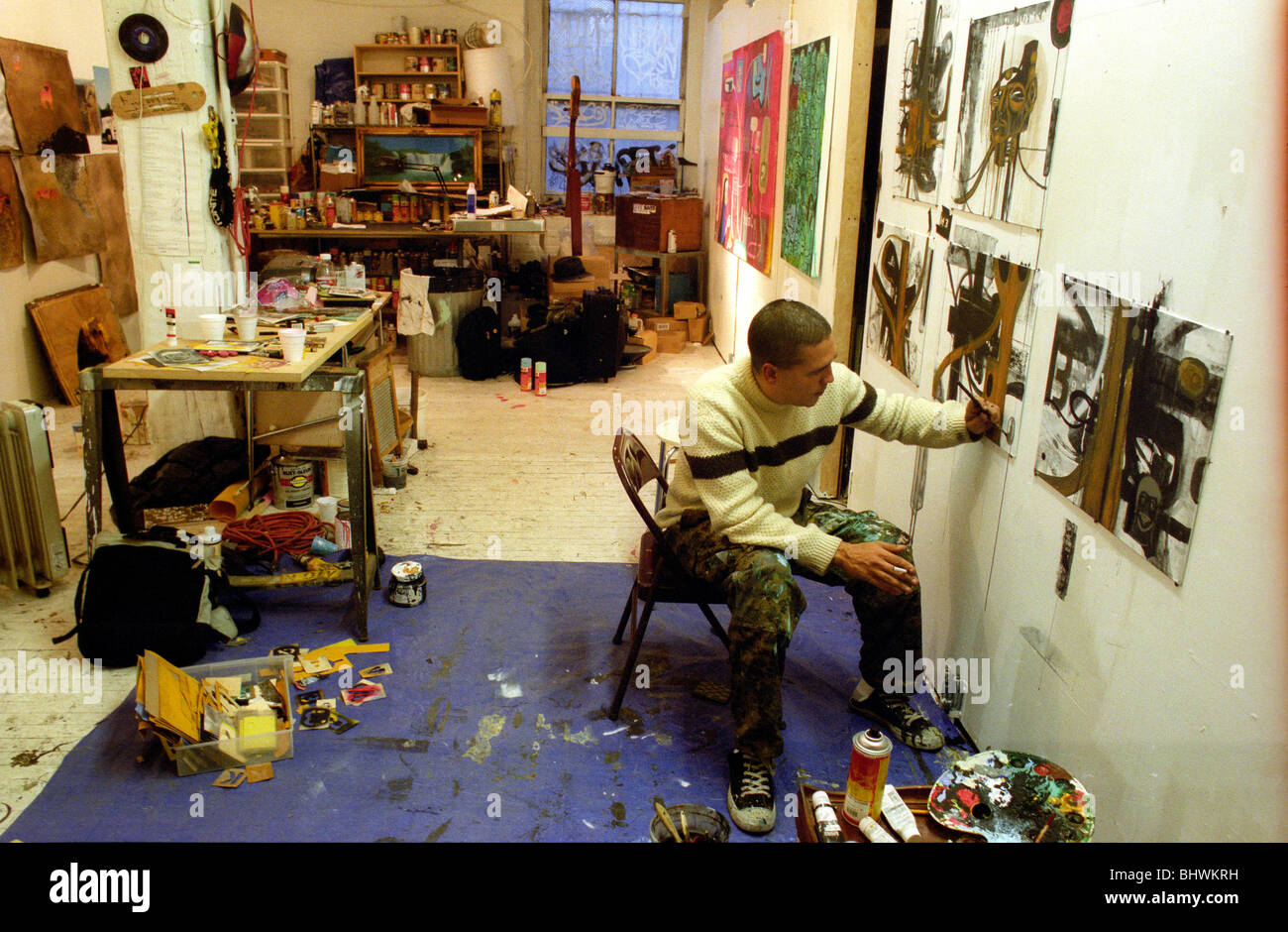 American underground graffiti artist Doze Green paints in his Brooklyn ...