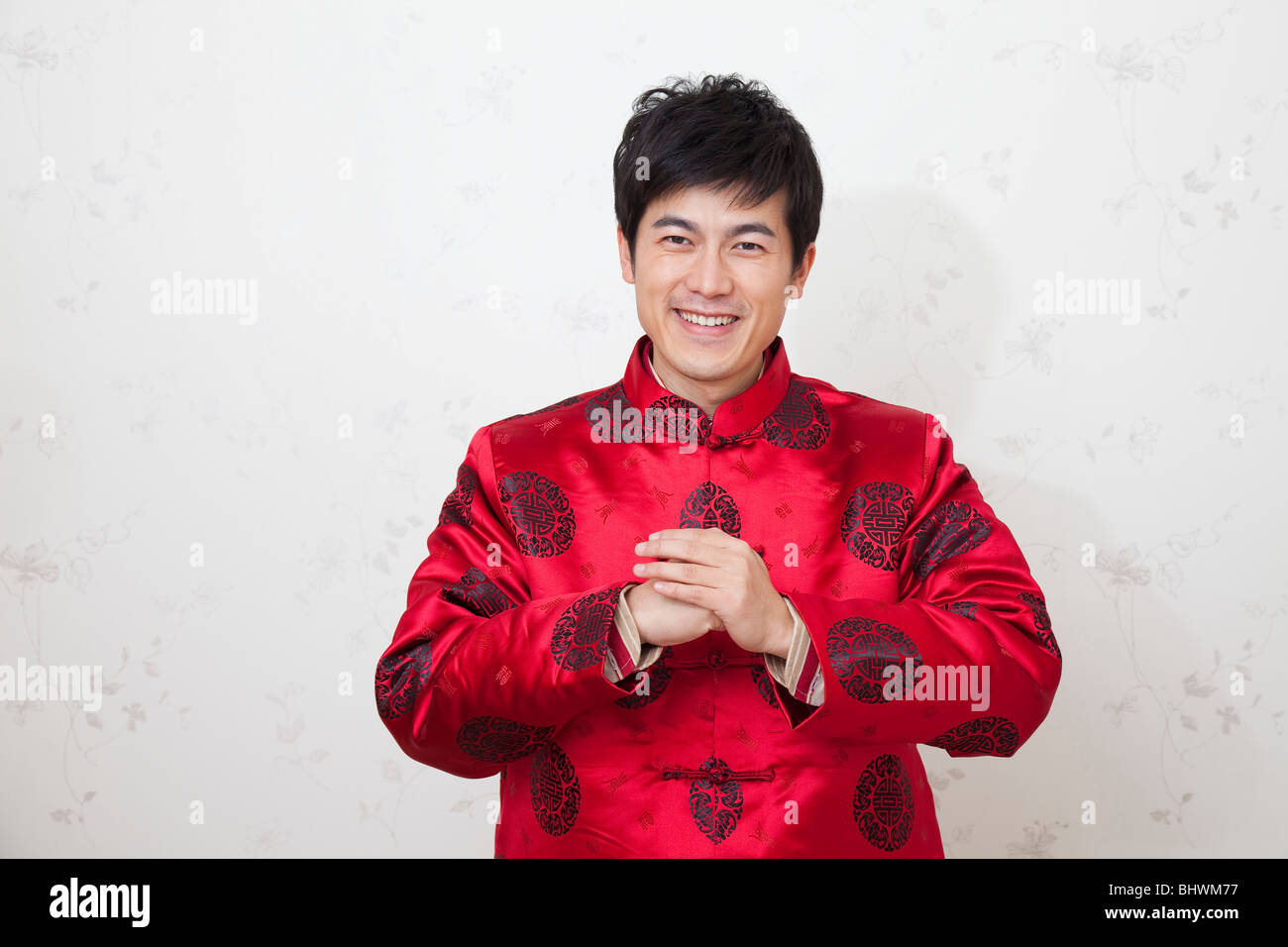 Young man celebrating festival Stock Photo - Alamy
