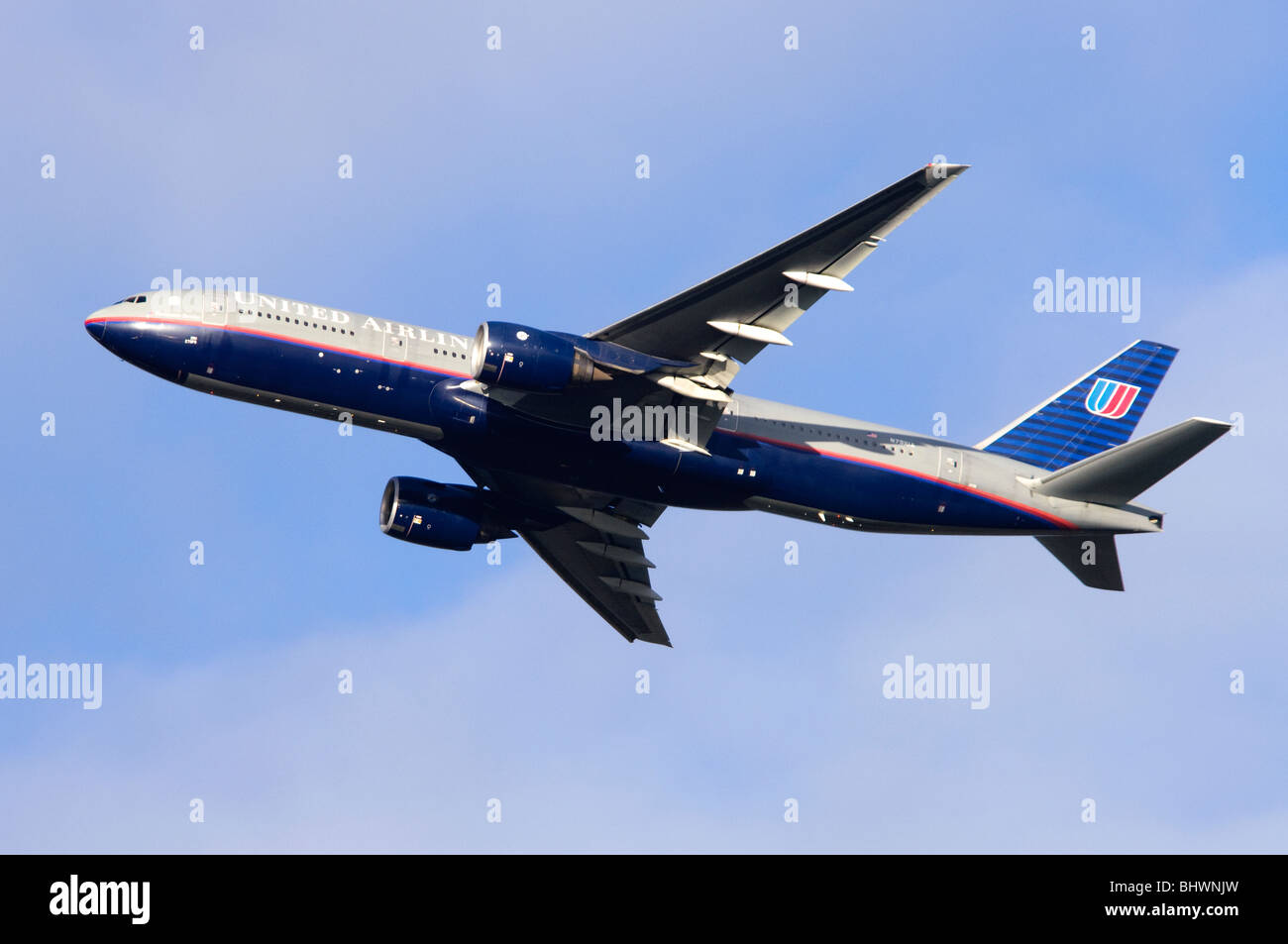 Boeing 777 operated by United Airlines climbing out from take off at ...