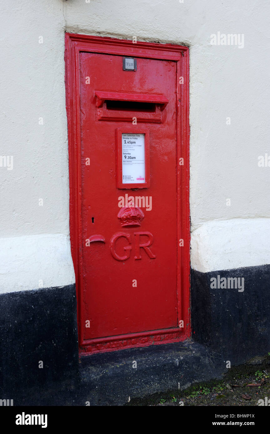 Royal Mail post box built into house wall of "The Old Post Office Stock ...