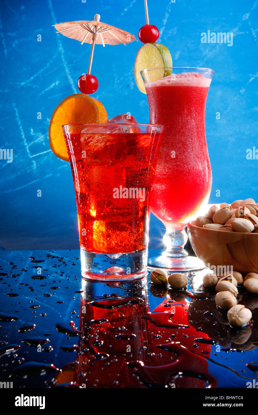 Strawberry daiquiri, cosmopolitan on the rocks and Grenadine Fizz with ...