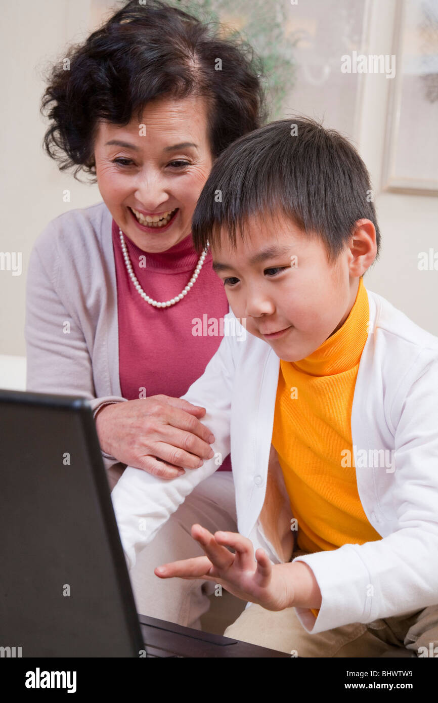 Cute chinese grandson sitting hi-res stock photography and images - Alamy