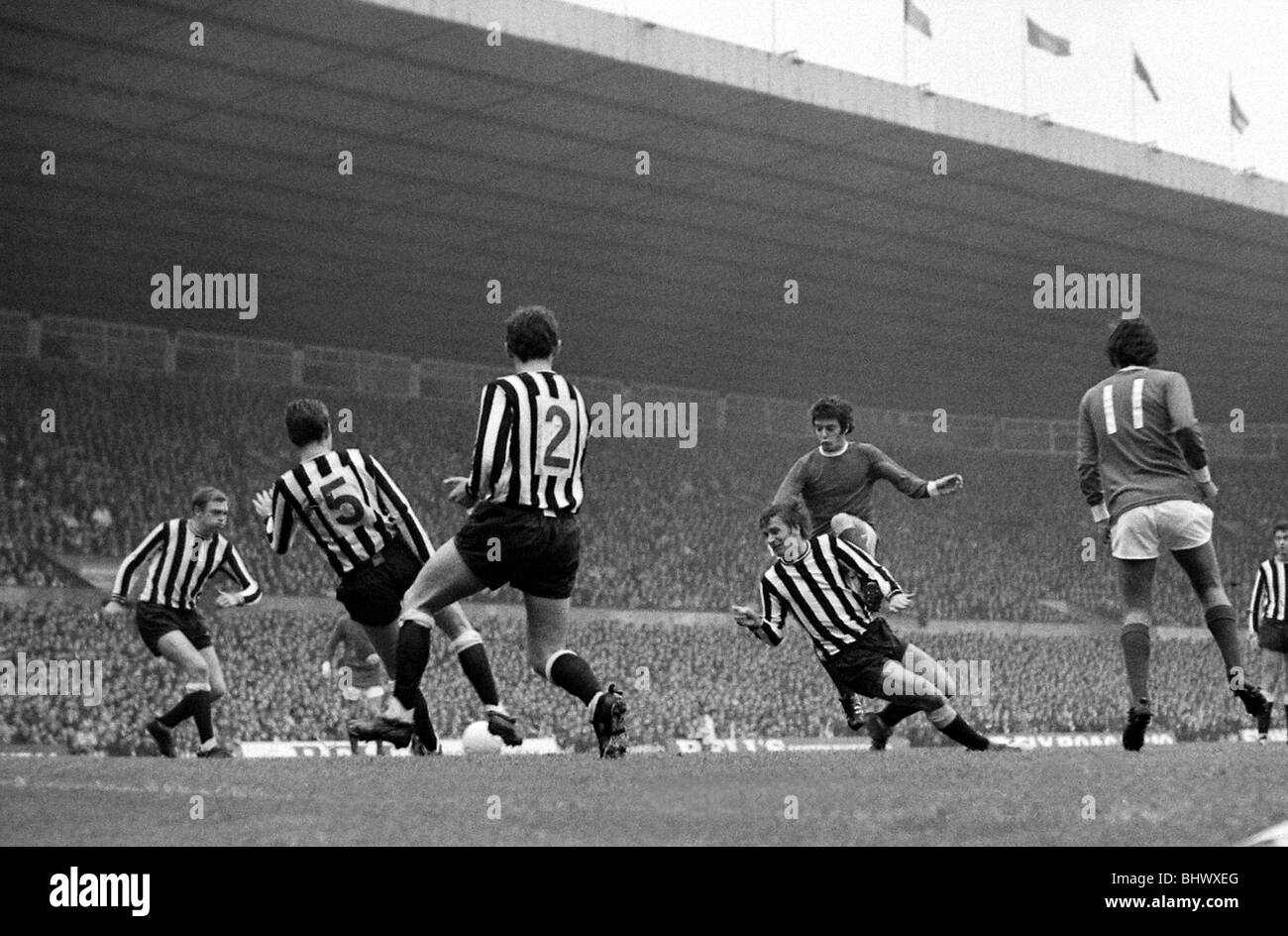 Manchester United's Willie Morgan takes on four Newcastle united ...