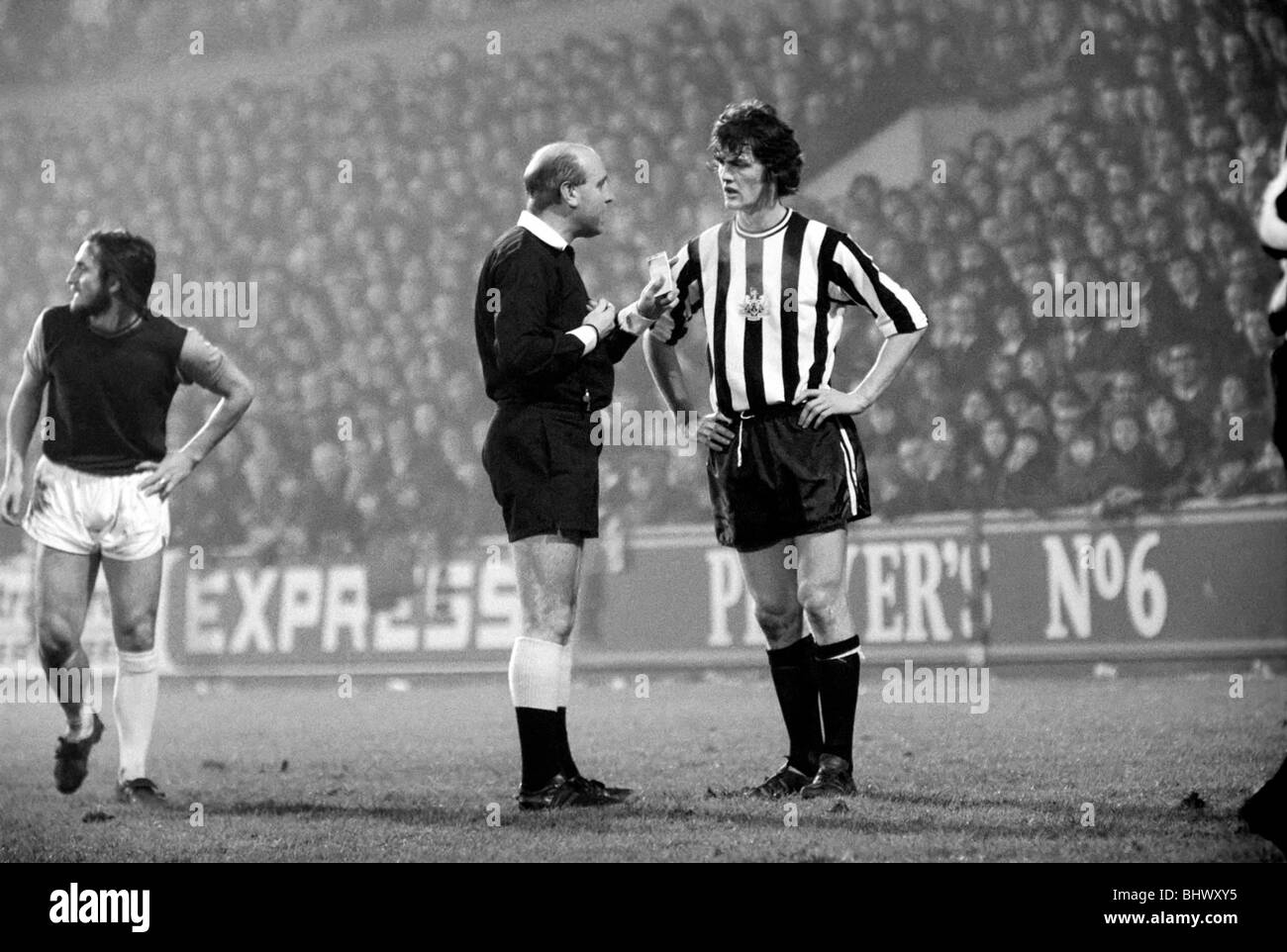 Football referee talking player Black and White Stock Photos & Images ...