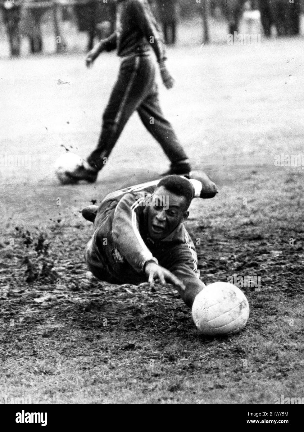 Brazilian football star Pele takes turn in goal. Training session at ...