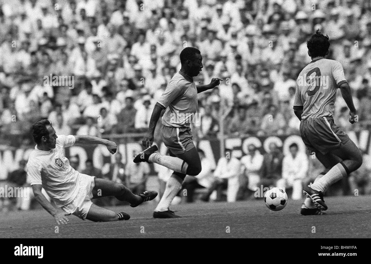 Pele of Brazil goes past a Czechoslovakian defender June 1970 during ...
