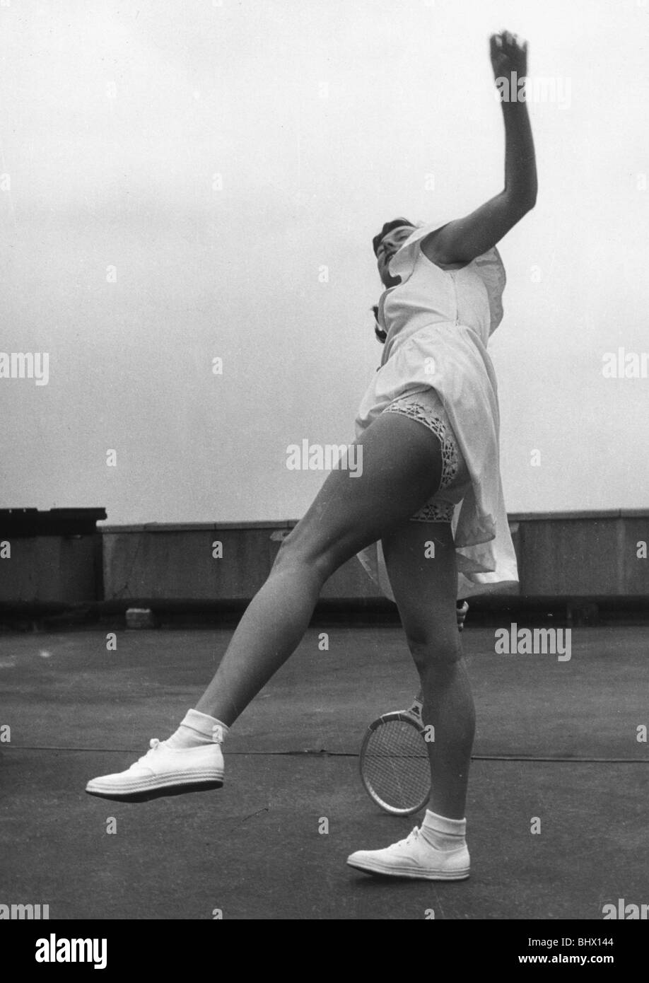 Wimbledon tennis star Gertrude "Gussie" Moran showing off her new style ...