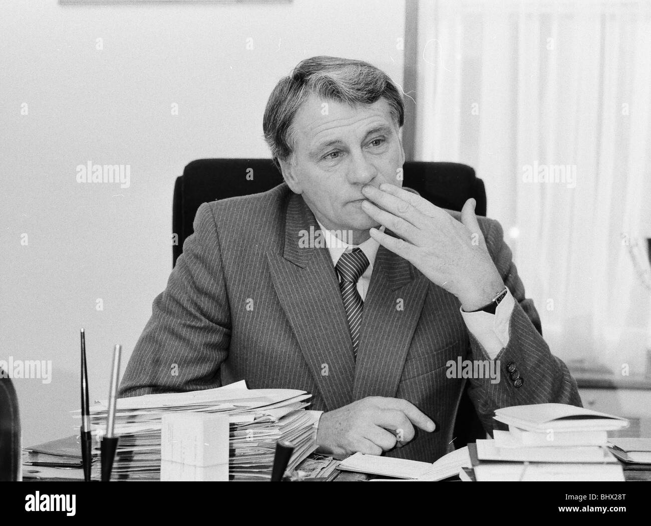 Manager 1980s suit tie trophy replica office busy paperwork hi-res ...