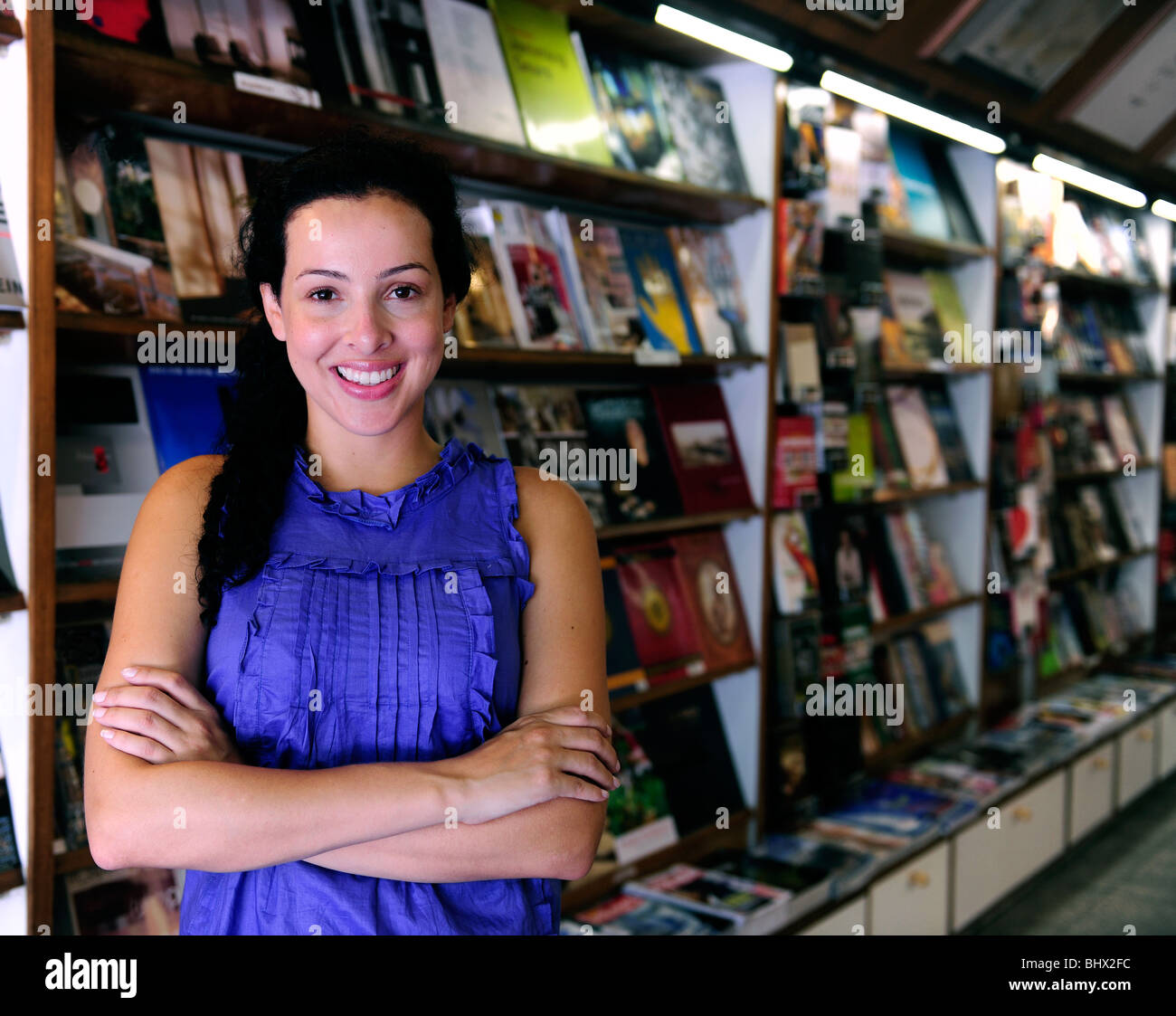 happy owner of a bookstore Stock Photo - Alamy