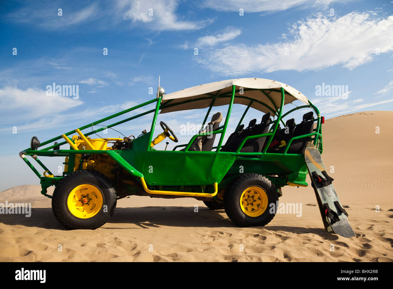 Dune buggy with boards for Sandboarding, Huacachina, Peru, South ...