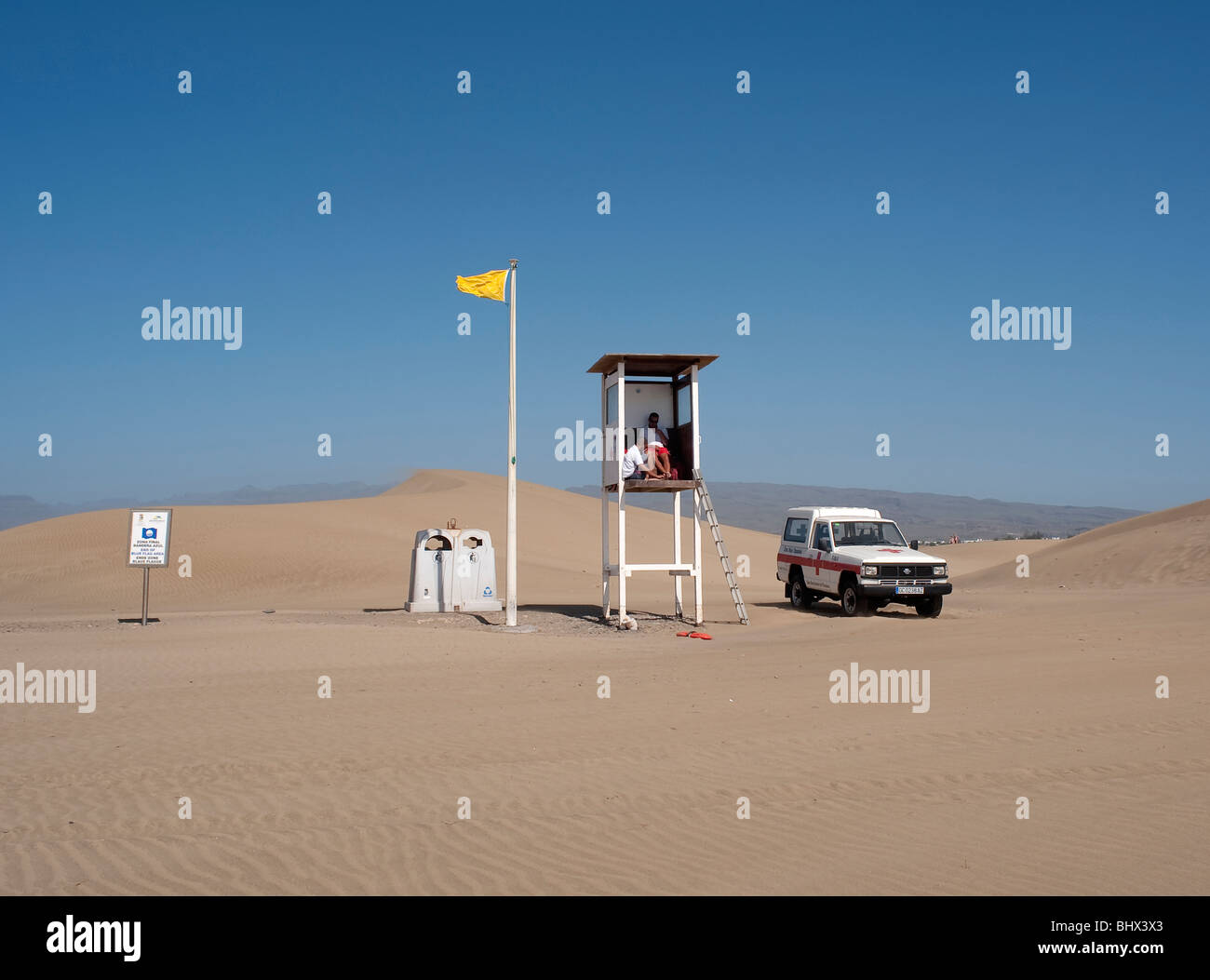 Life savers on the beach Stock Photo - Alamy