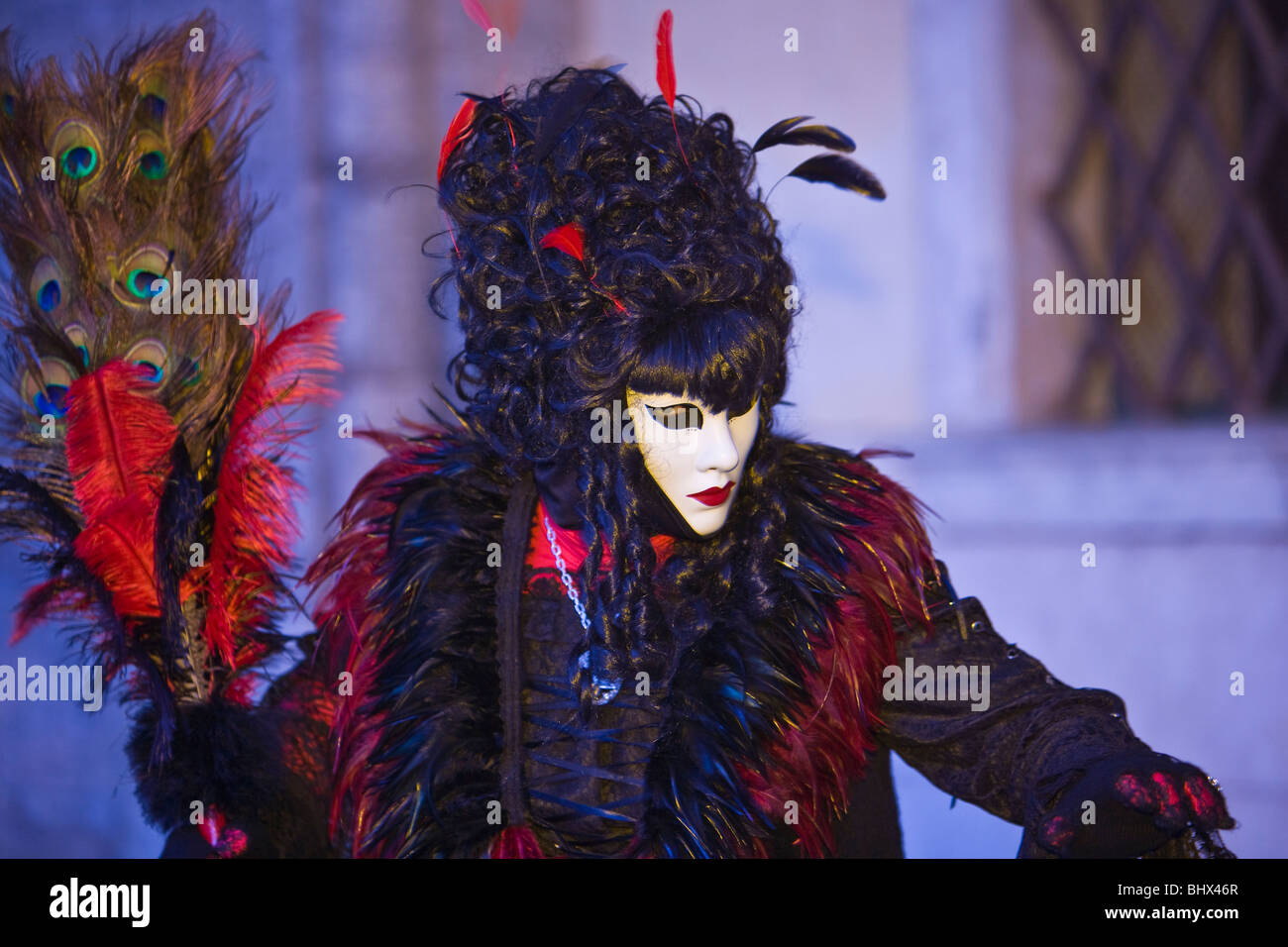 Masked woman in blue hi-res stock photography and images - Alamy