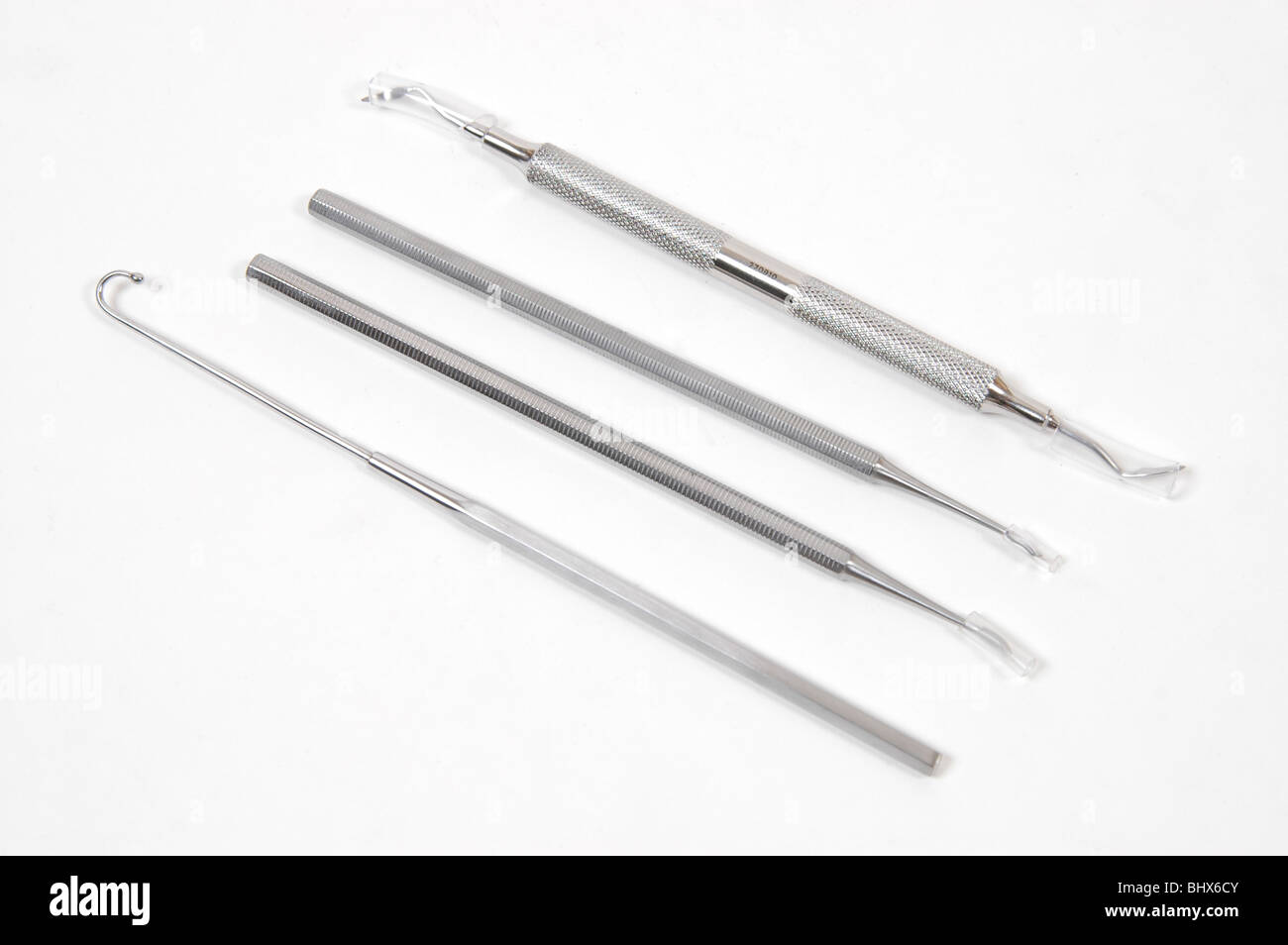 Dental instruments on stainless Cut Out Stock Images & Pictures - Alamy