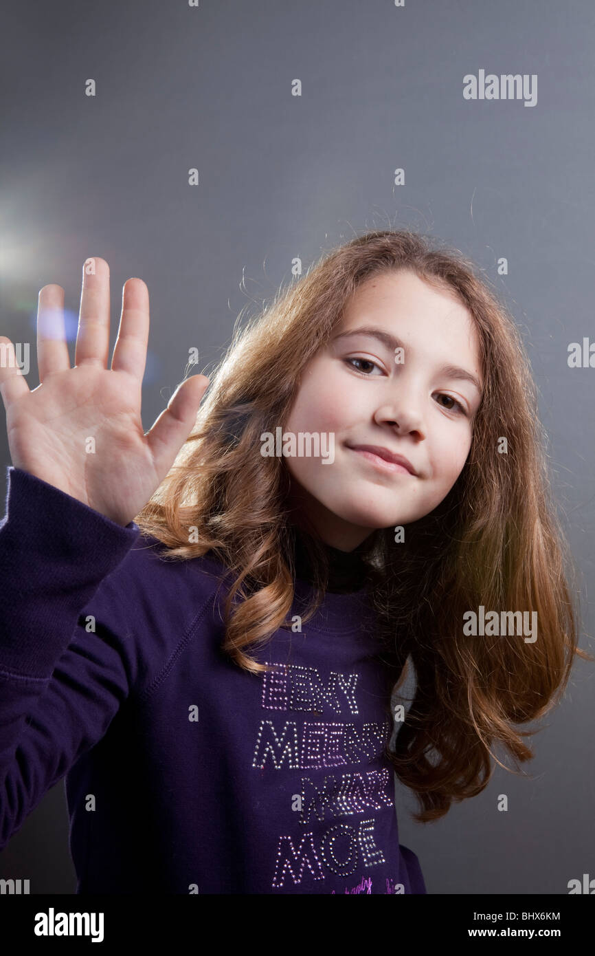 Child waving goodbye Stock Photo - Alamy
